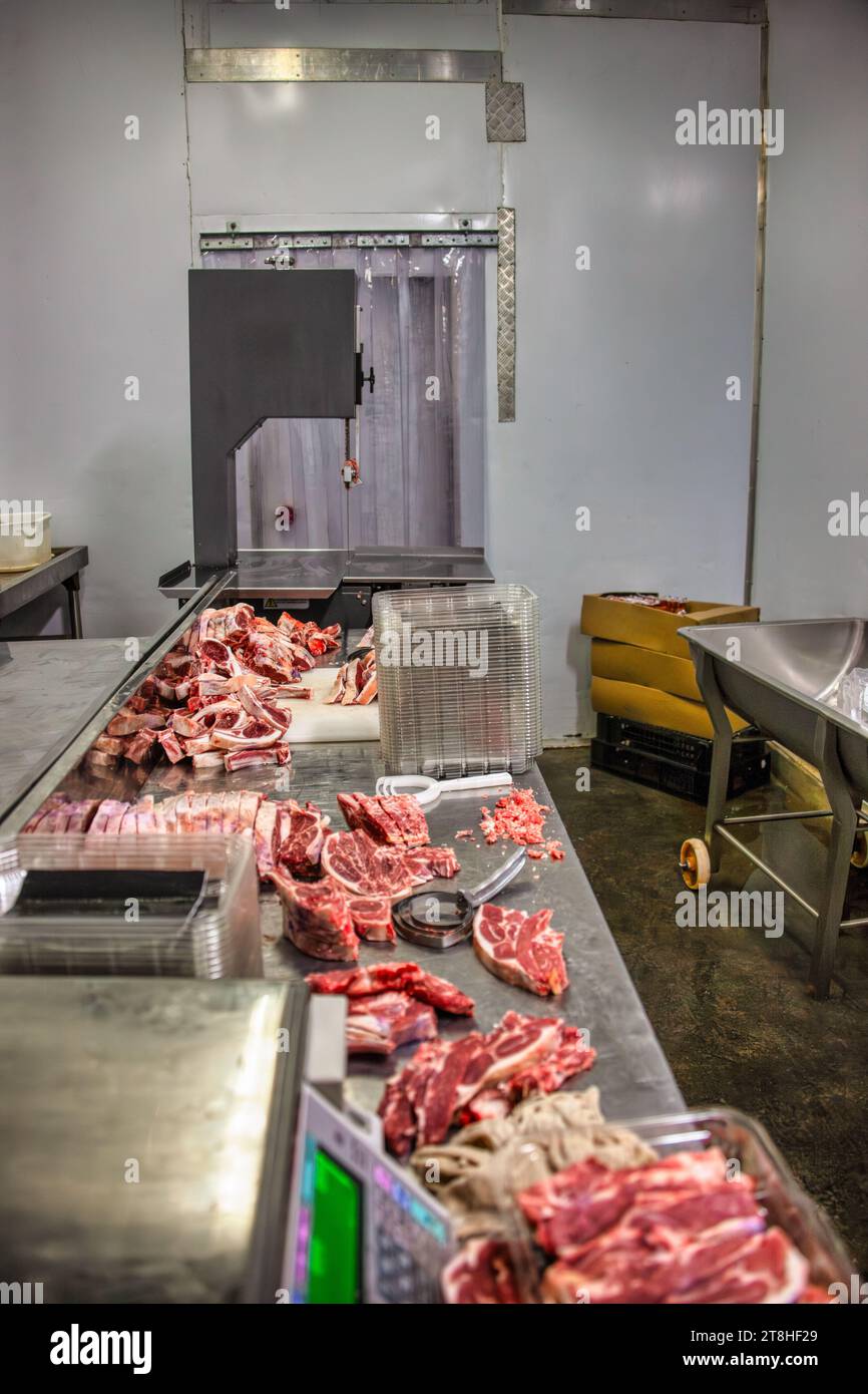 meat processing plant, storage freeze room, beef meat and a scale in ...