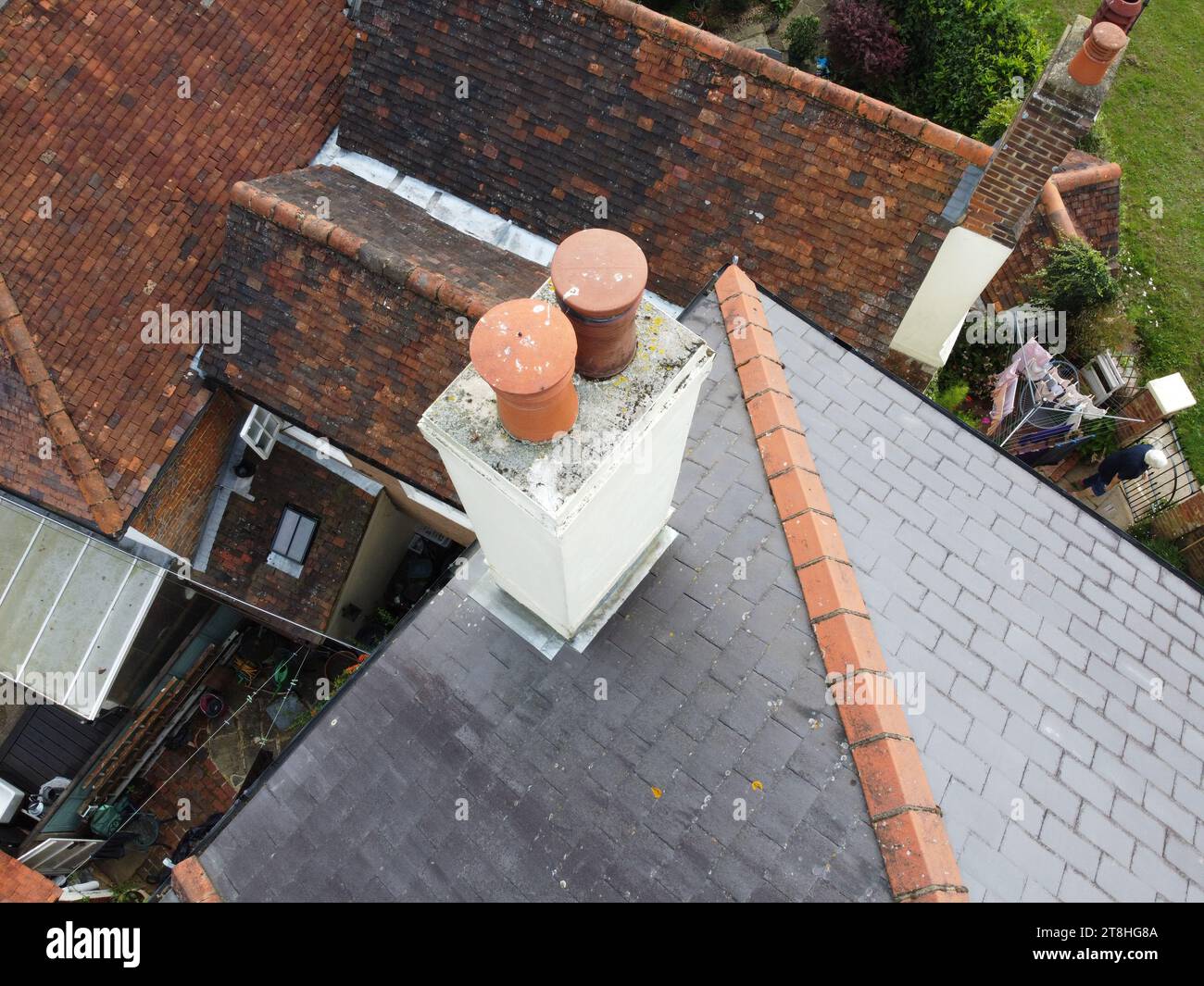 Aerial view of tiled roof and chimney pots on British cottage Stock ...
