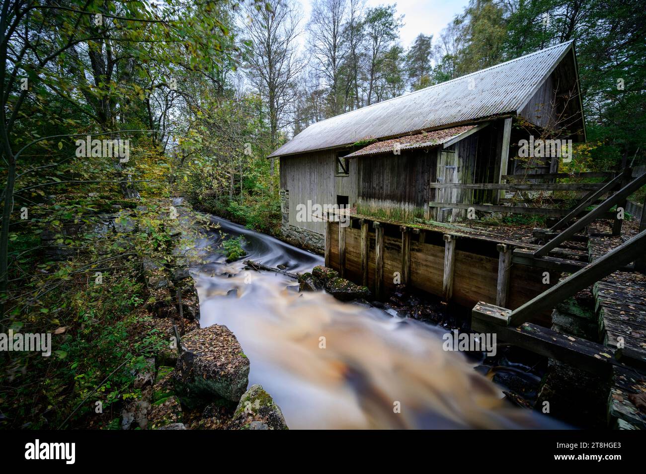 Historic sawmill with a streaming river in a forest in the south of ...