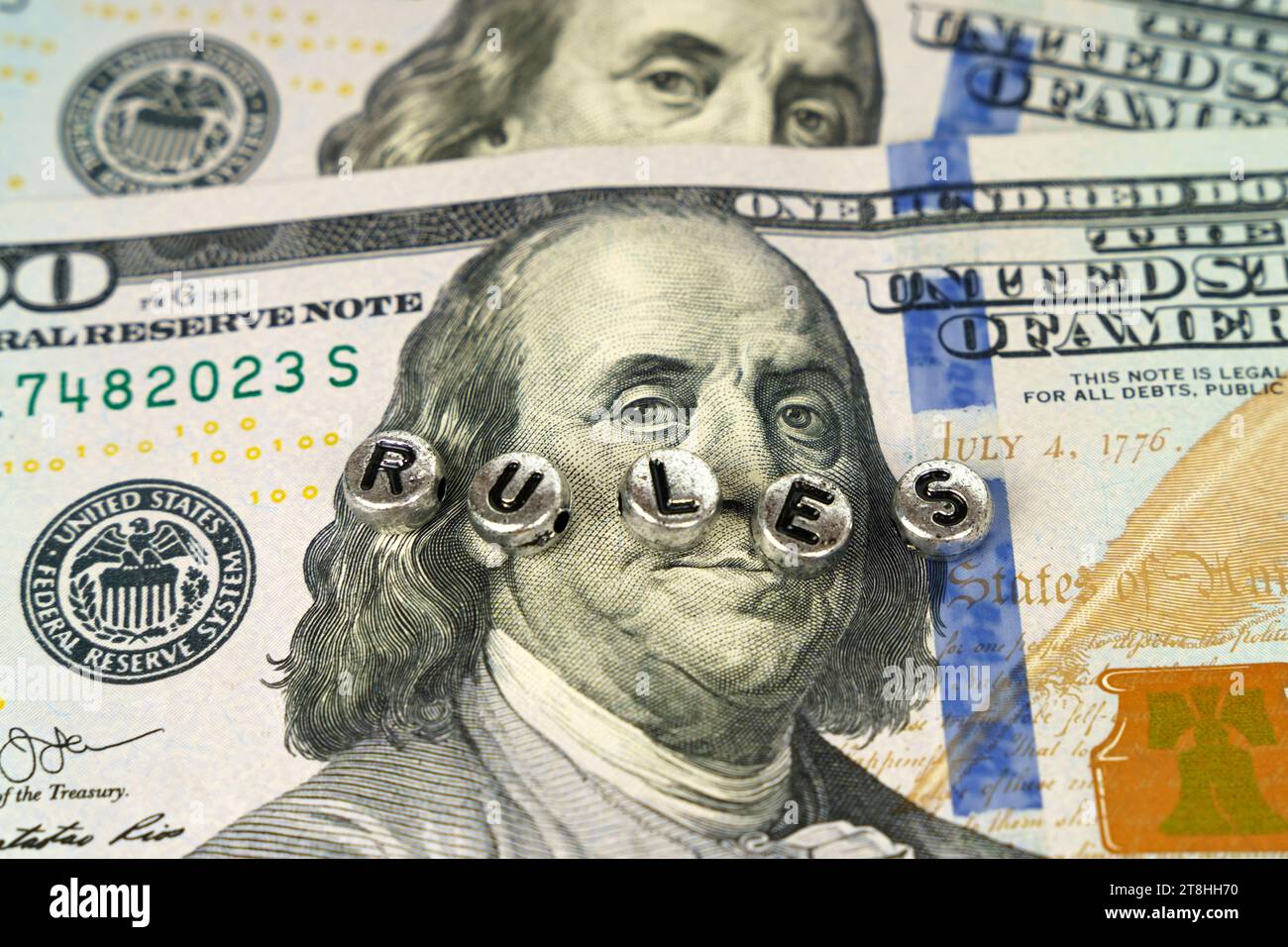 Economics and business. On the US hundred dollar bill there are metal ...