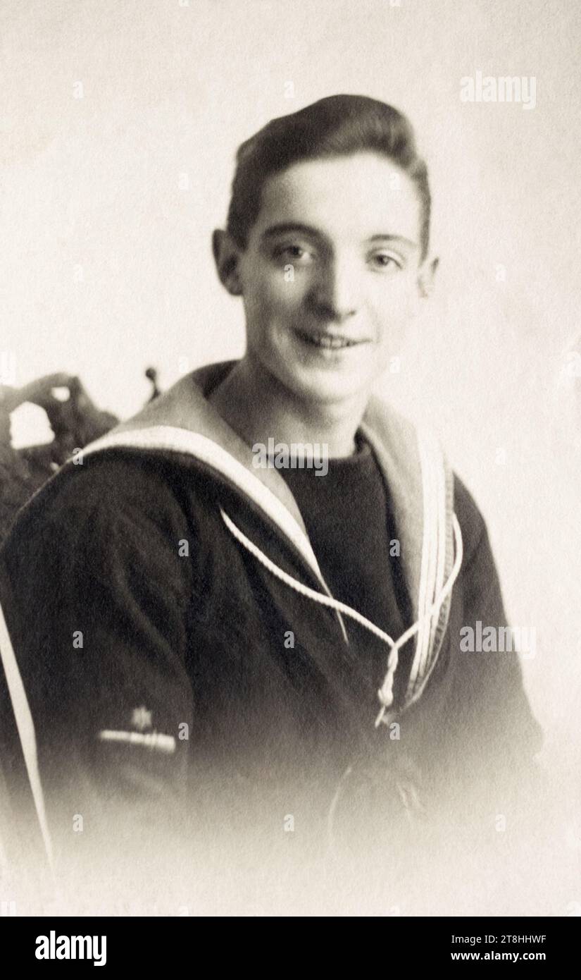 A Royal Navy sailor with a Seaman Gunner trade badge Stock Photo - Alamy