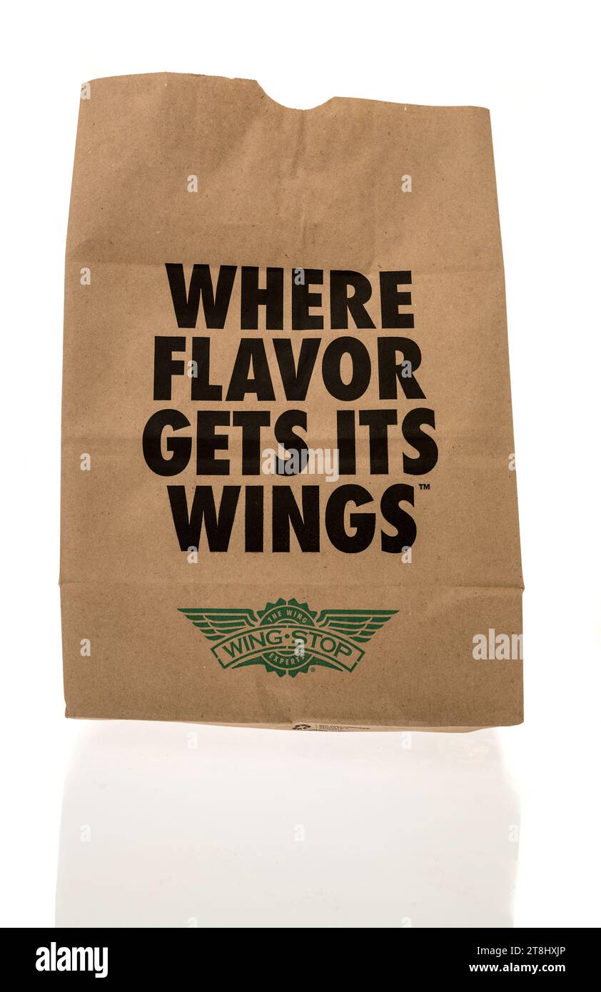 Winneconne, WI - 12 October 2023: A Wing Stop paper bag on an isolated ...