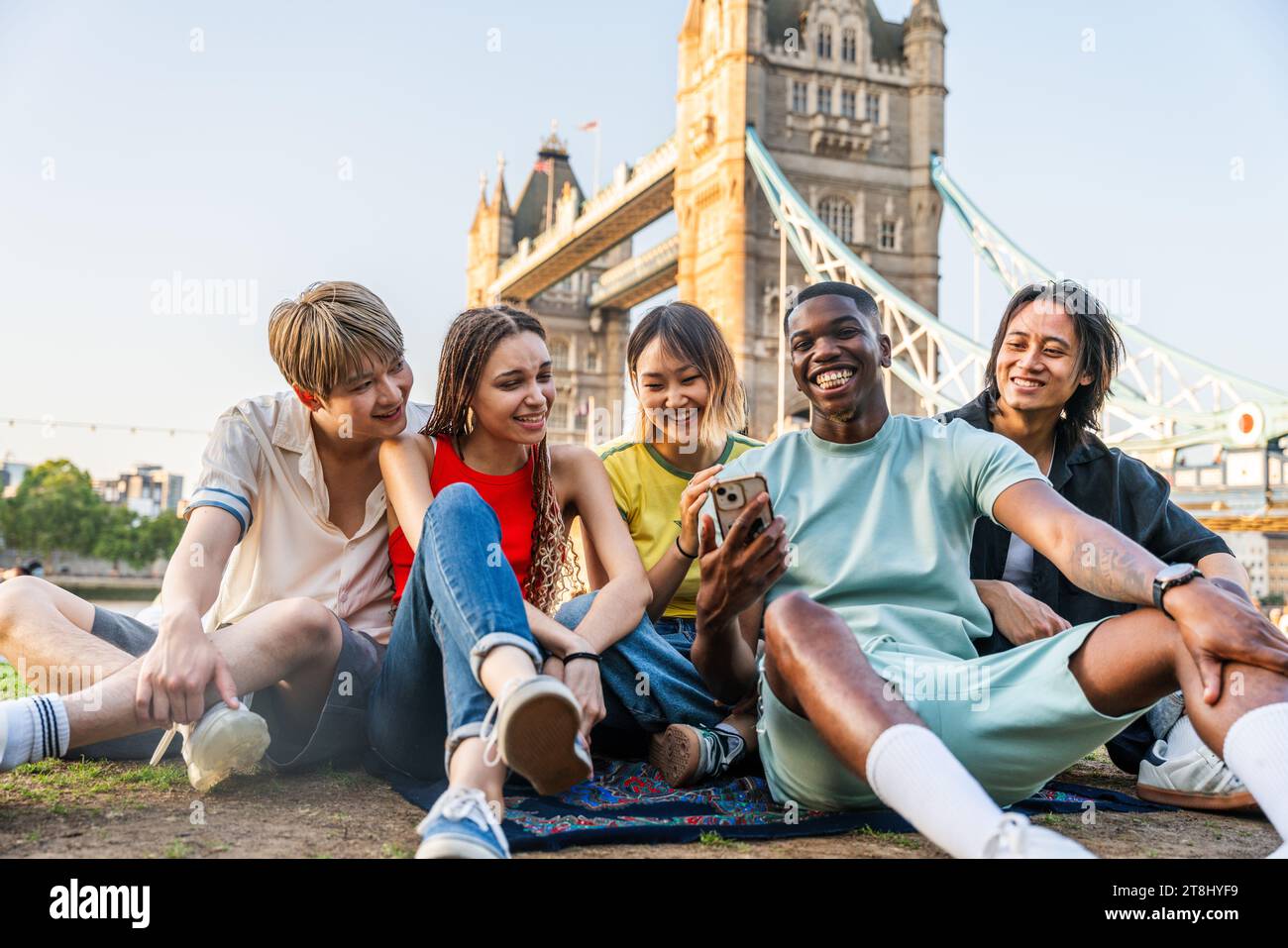 Diverse people happy london park hi-res stock photography and images ...