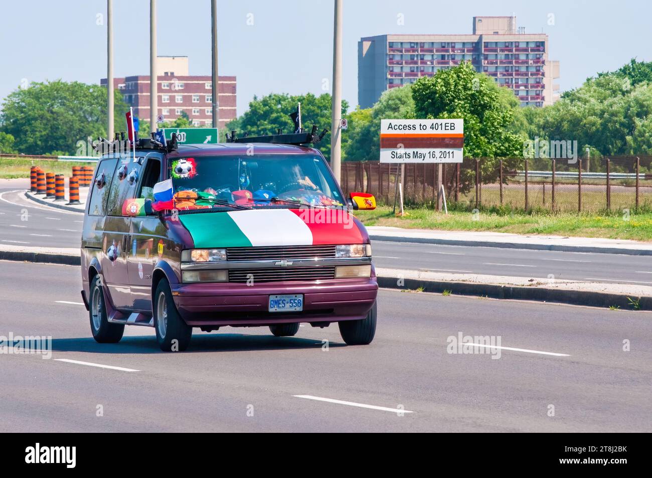 TORONTO, CANADA, A van covered in soccer stickers drives in Victoria ...