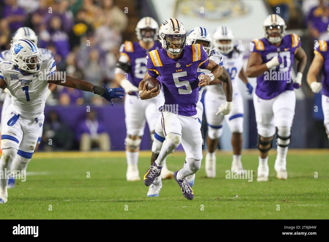 November 18, 2023: LSU quarterback Jayden Daniels (5) breaks a long run ...