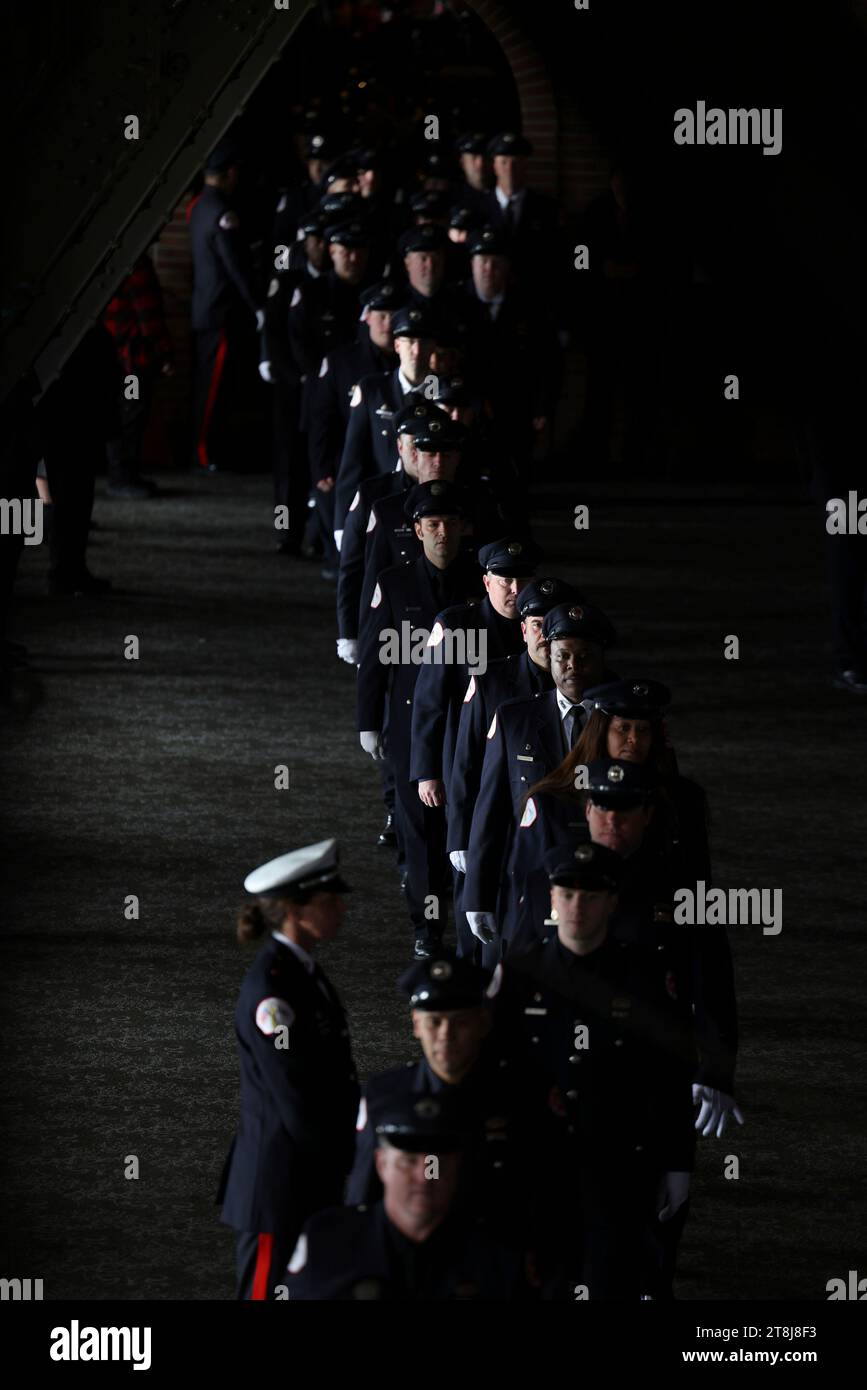 CORRECTS DATE TO NOV. 20 INSTEAD OF NOV. 10 - A firefighter pays his ...