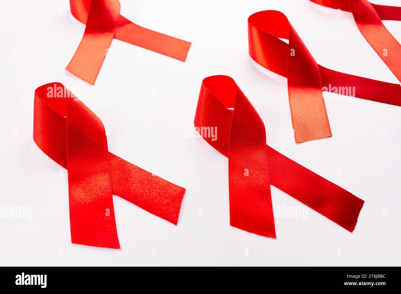Red ribbons HIV, AIDS on white background, Awareness,Top view Stock Photo - Alamy