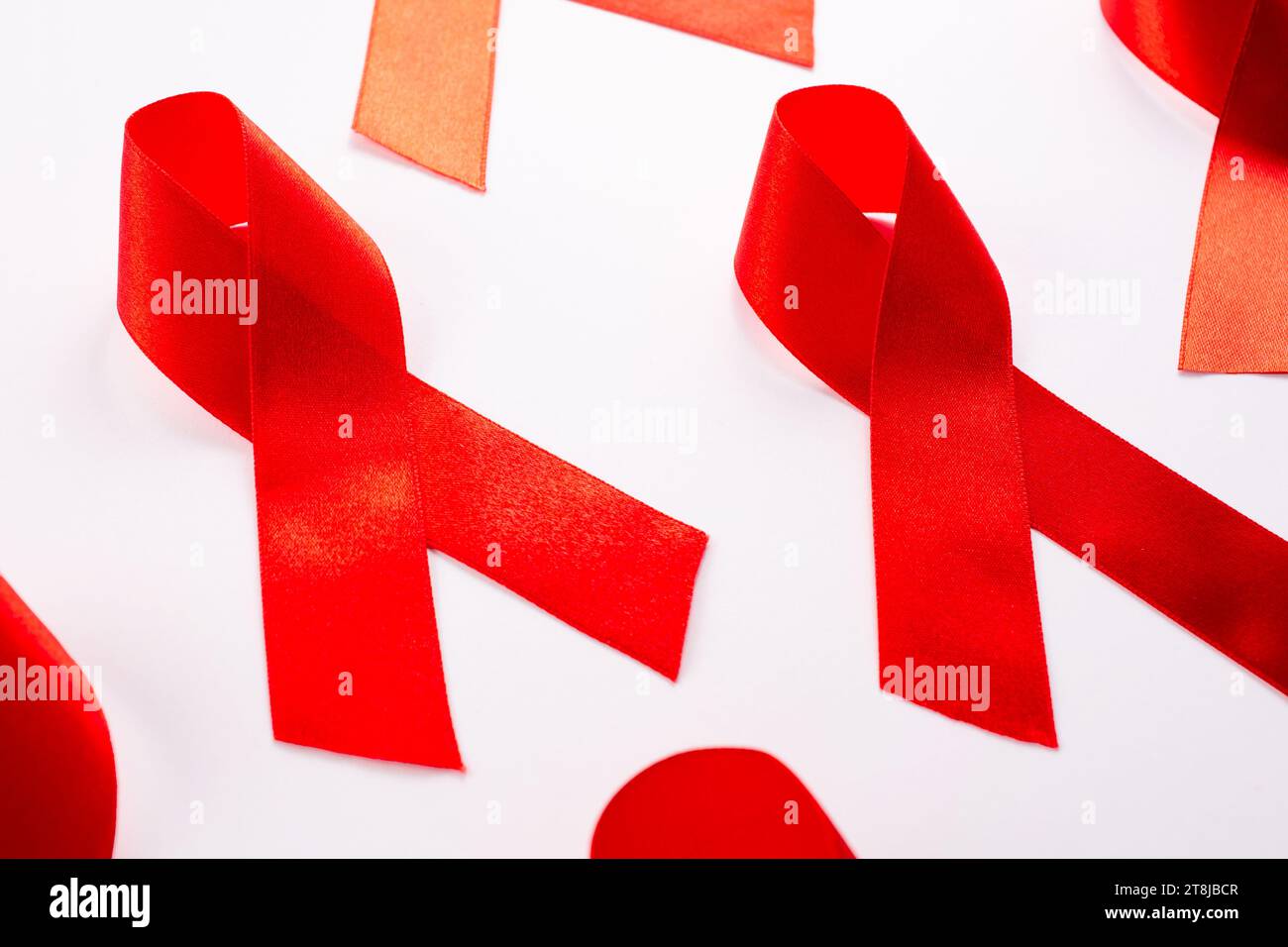 Red ribbons HIV, AIDS on white background, Awareness,Top view Stock Photo - Alamy