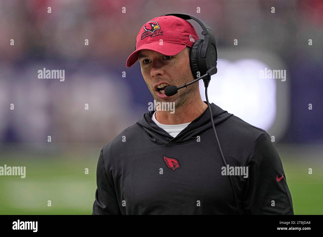 Arizona Cardinals coach Johnathan Gannon walks along the sideline ...