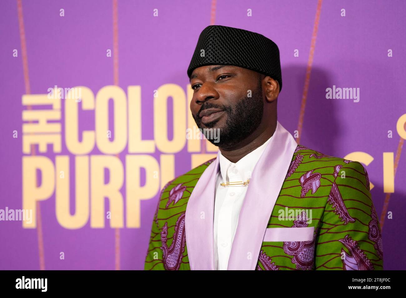 Director Blitz Bazawule poses for photographers upon arrival at the ...