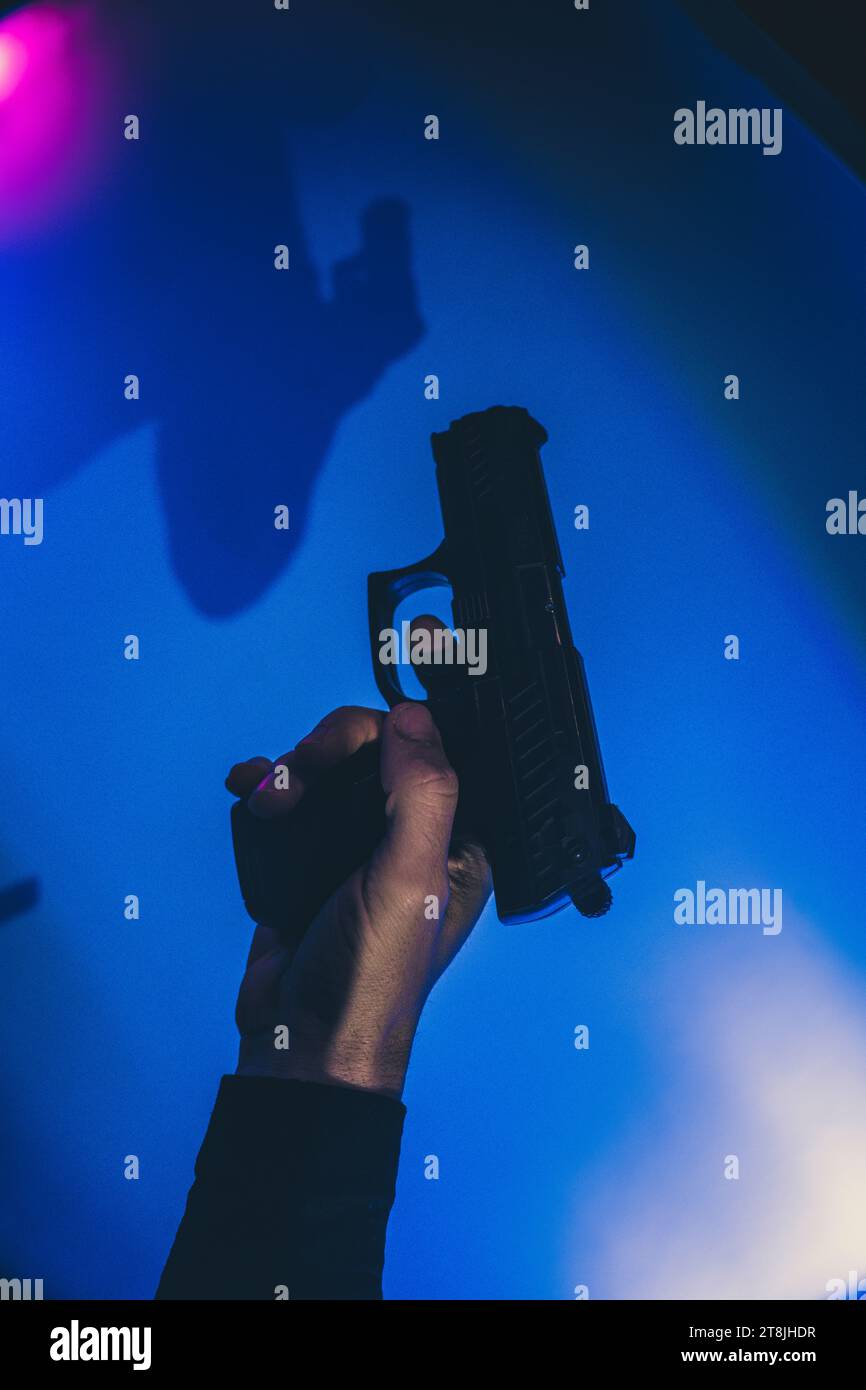 Pistol gun artistic photograph book cover design Stock Photo - Alamy