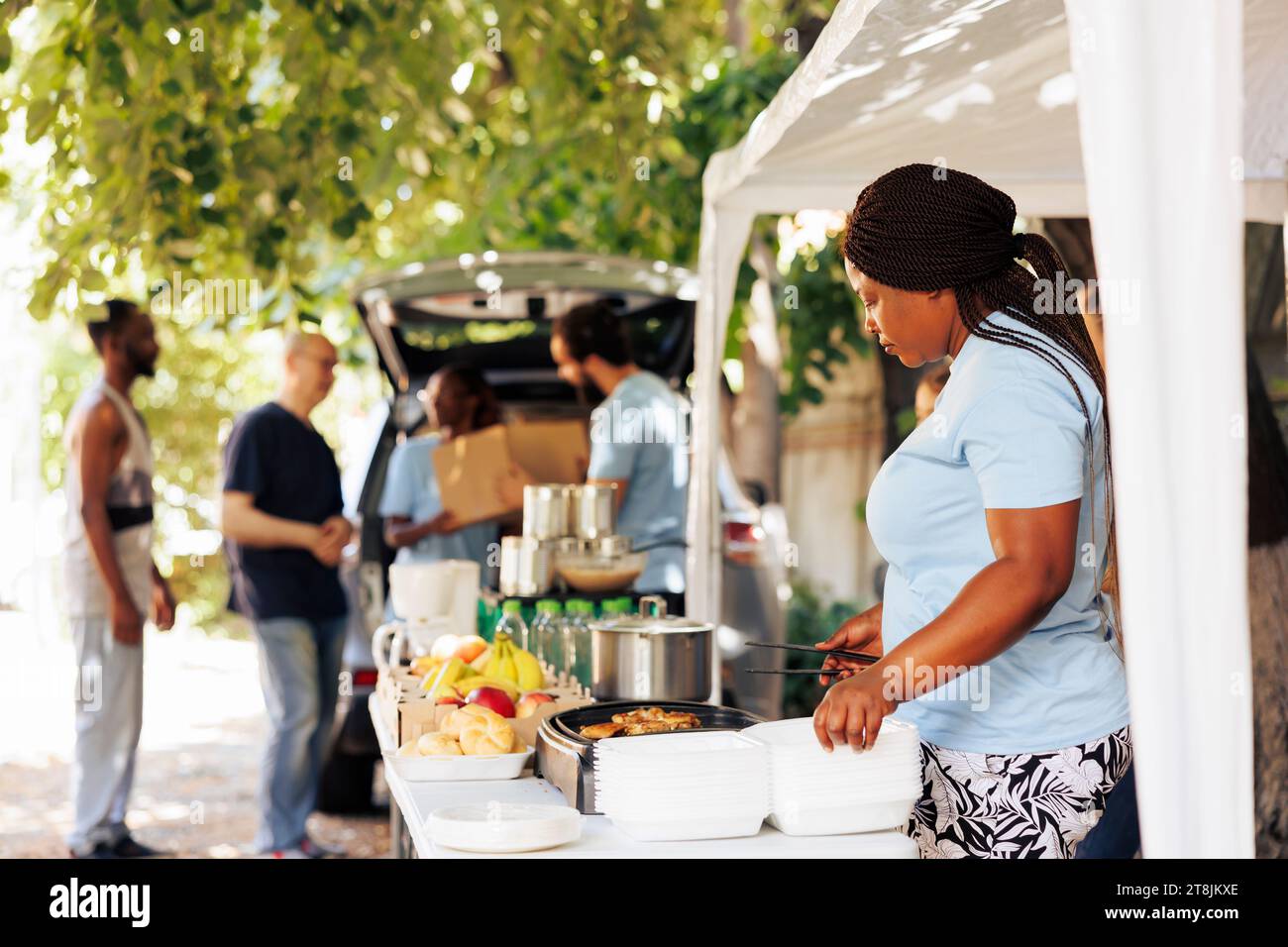 Non profit helping hand hi-res stock photography and images - Alamy