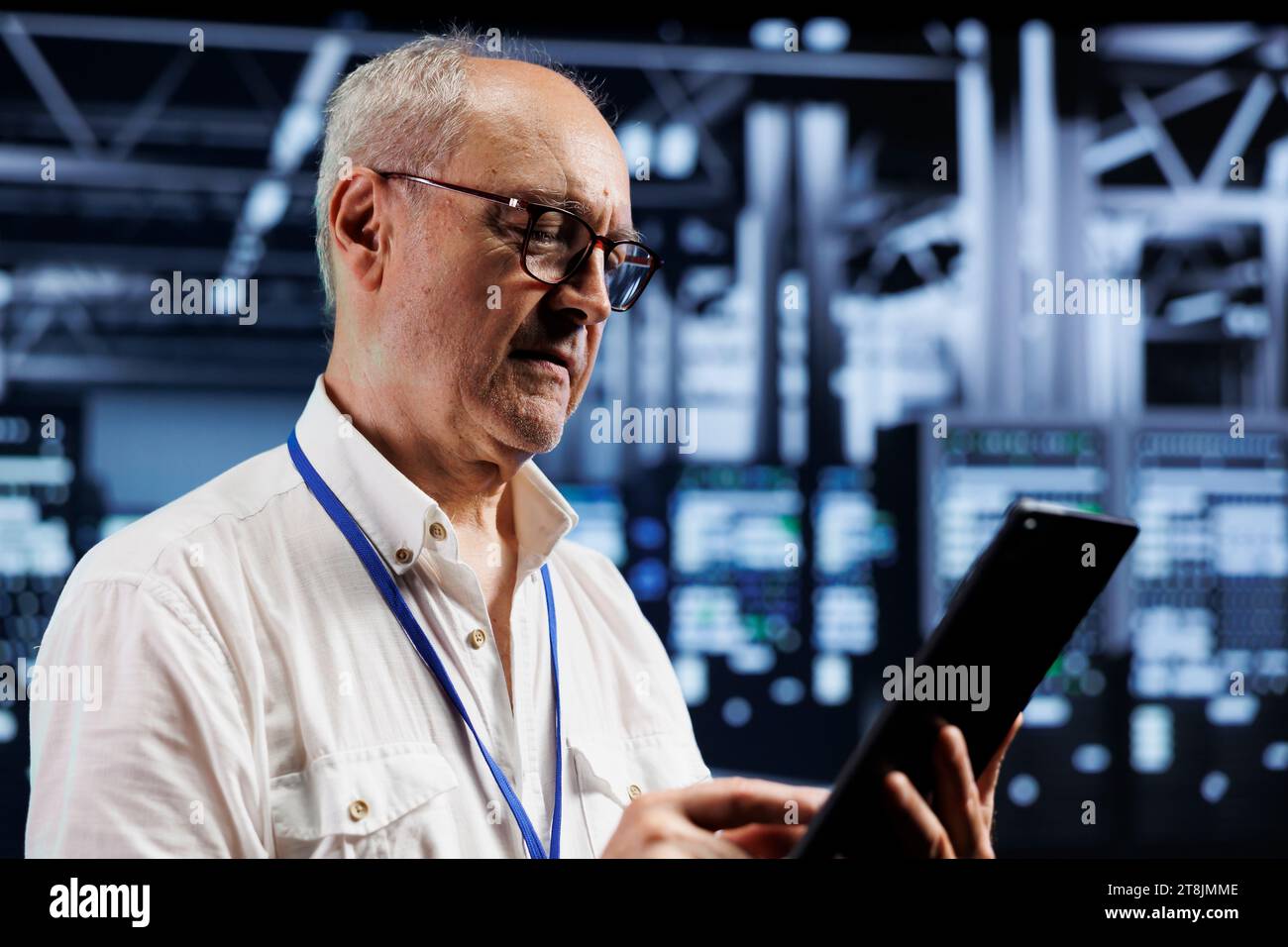 Senescent technician in cryptocurrency mining farm with specialized servers using Blockchain ...