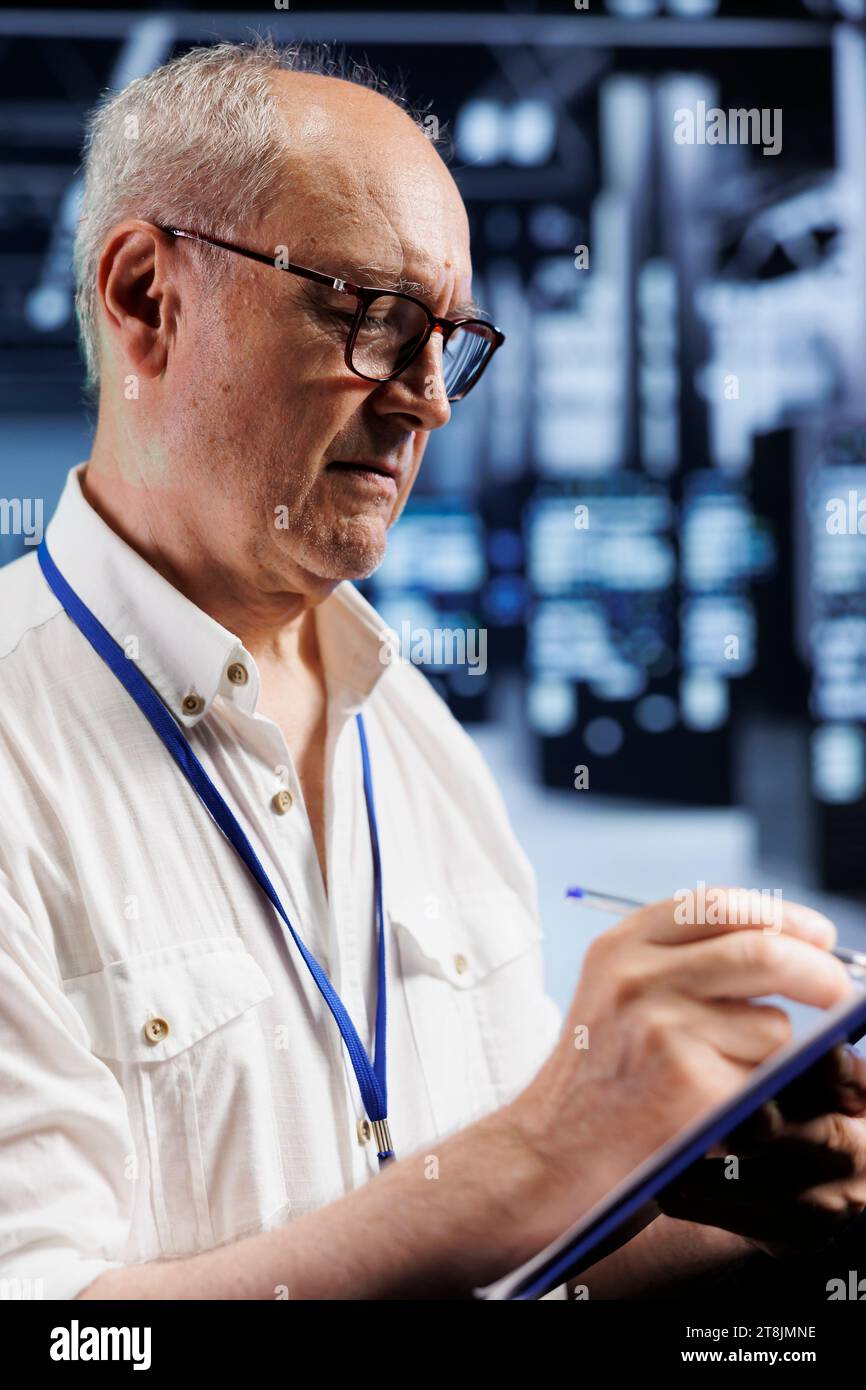 Aged computer scientist in crypto mining farm with specialized ...