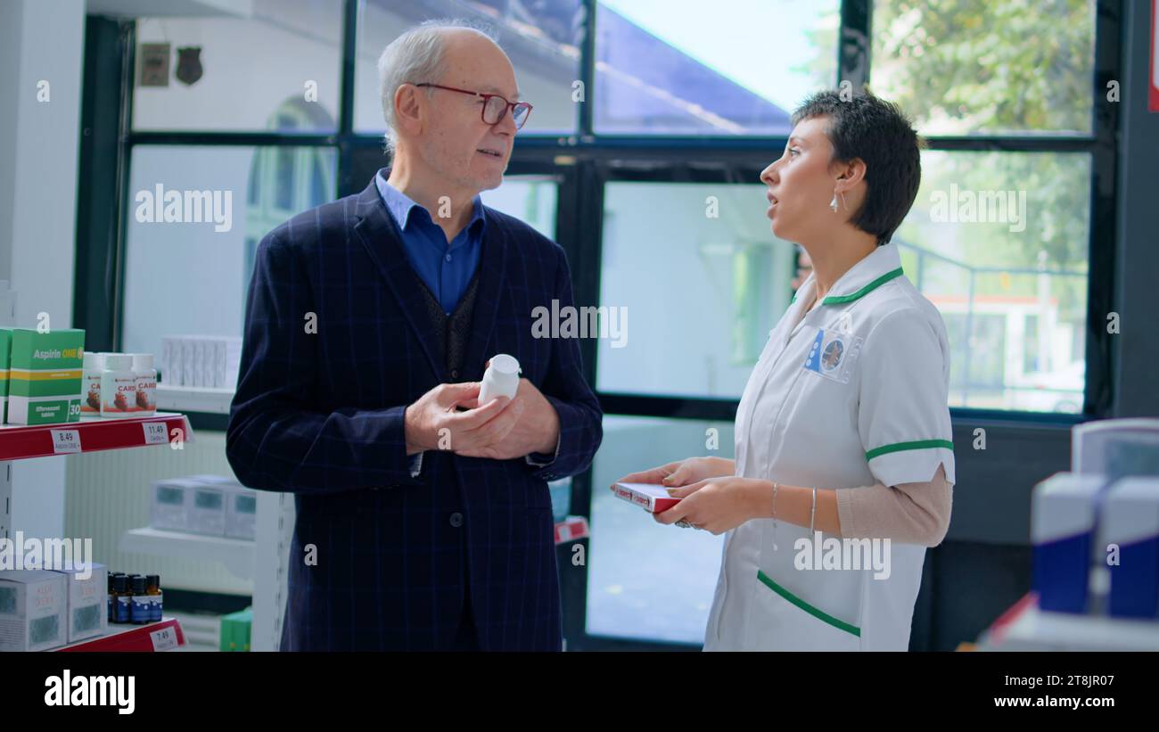 Asking pharmacist for cure hi-res stock photography and images - Alamy
