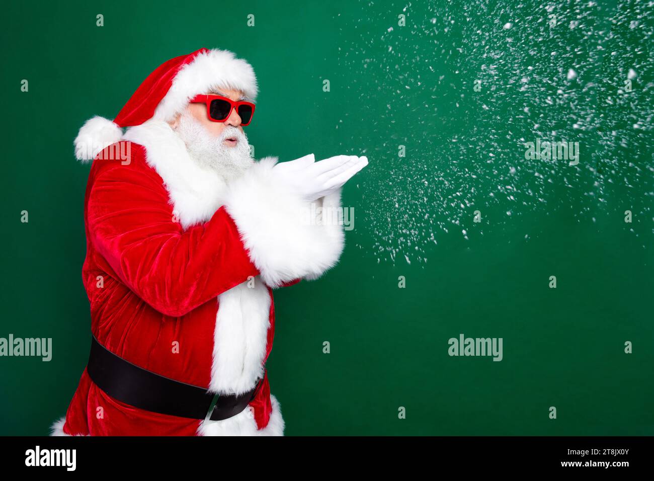 Photo portrait of elderly retired man hands blowing snowy wind dressed ...