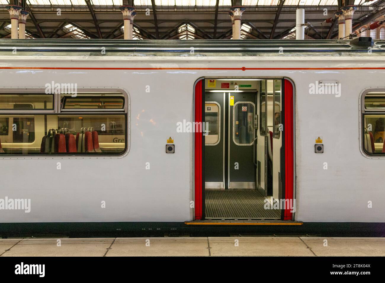 Train with open doors at station, Liverpool Street Station, London ...