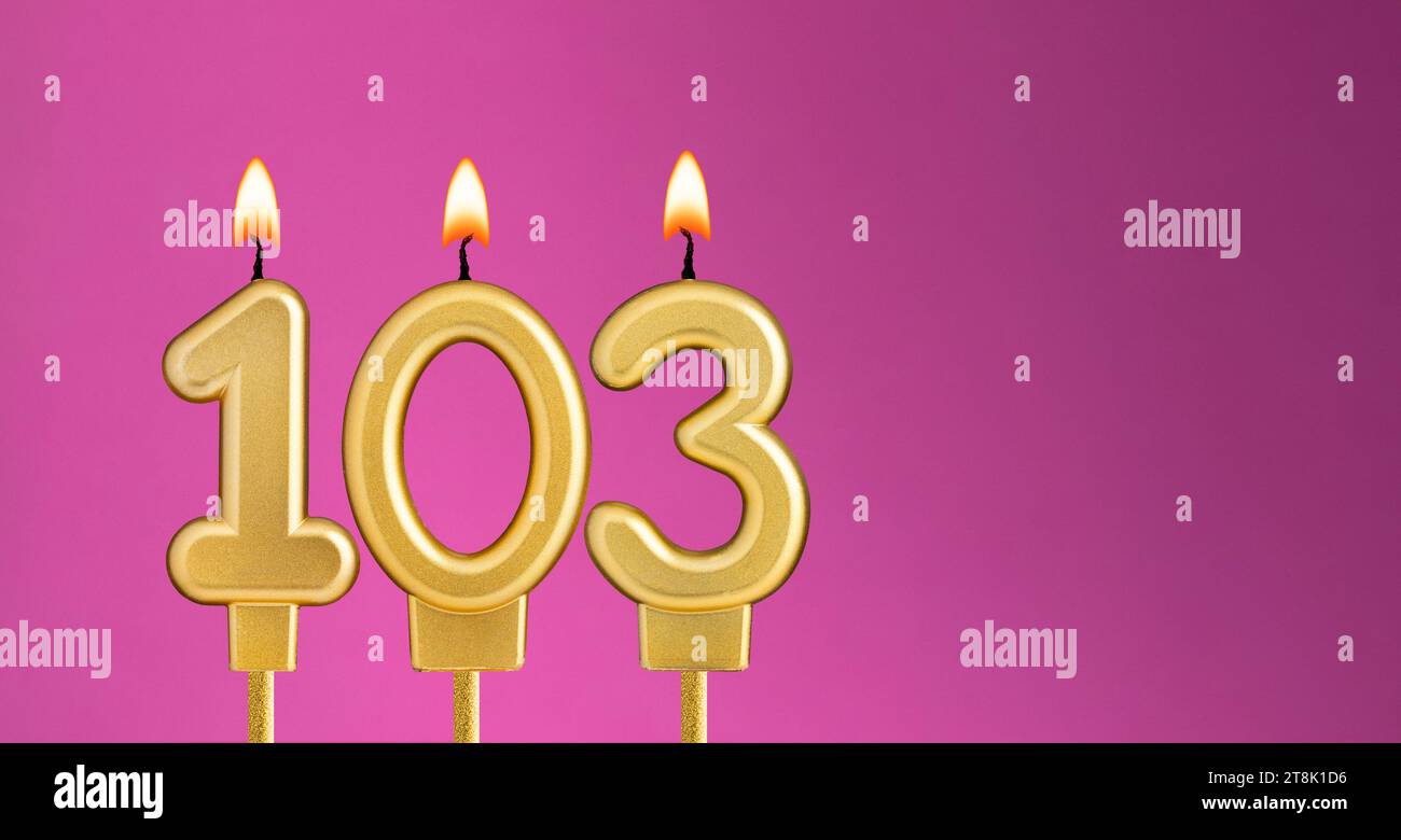 Candle number 103 in purple background - birthday card Stock Photo - Alamy