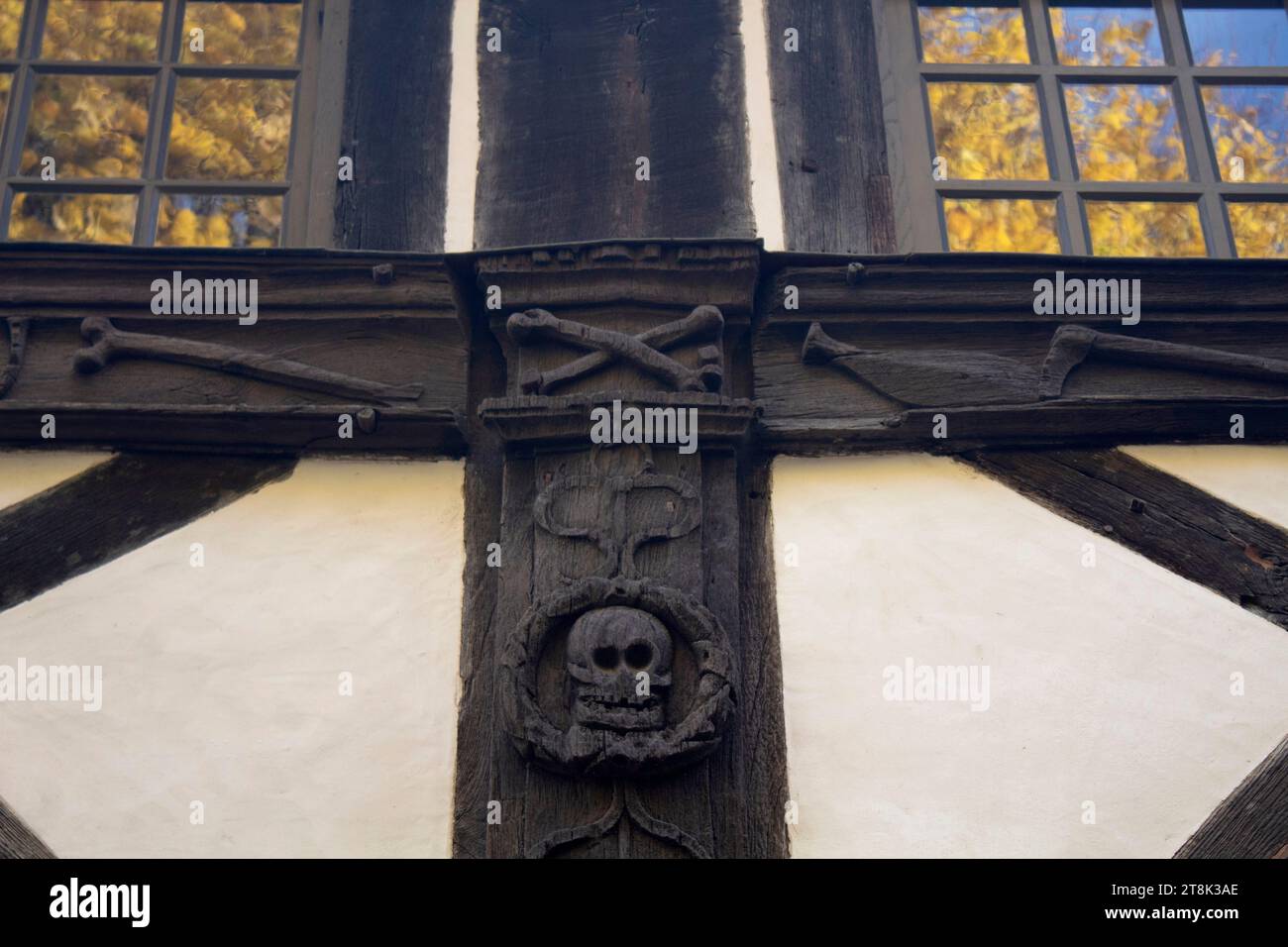 Skulls, crossbones and gravediggers’ tools carved on the timber of the ...