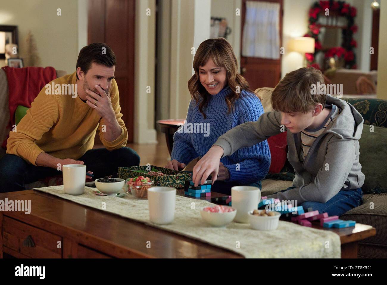 A WORLD RECORD CHRISTMAS, from left: Lucas Bryant, Nikki DeLoach, Aias ...