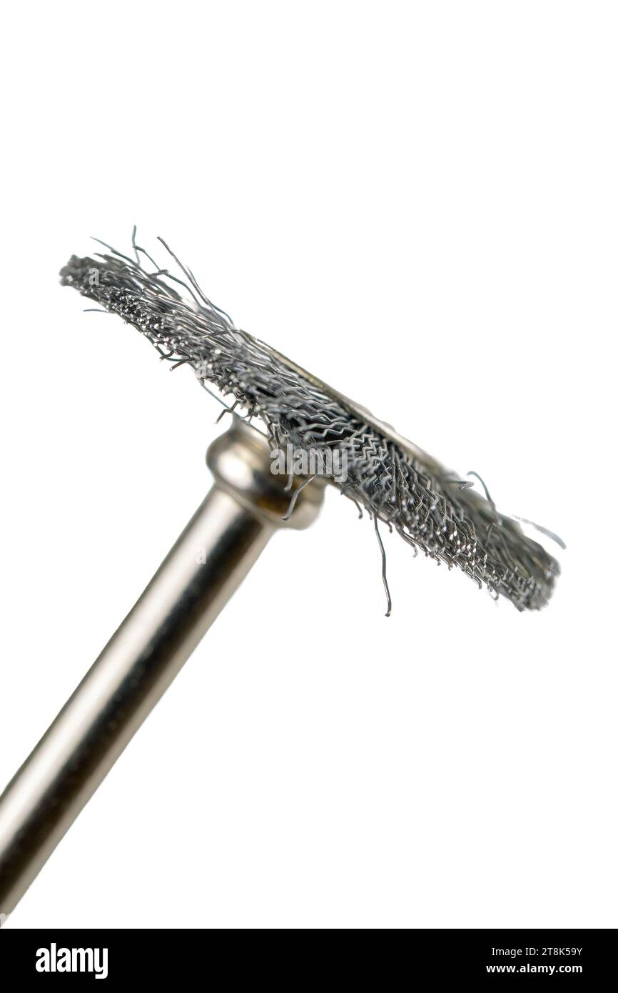 Macro of a metal wire drill isolated in white Stock Photo - Alamy