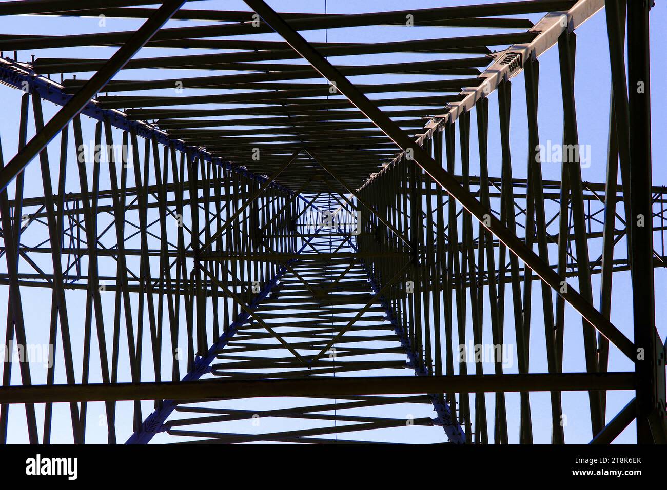 high-voltage pylon from below Stock Photo - Alamy