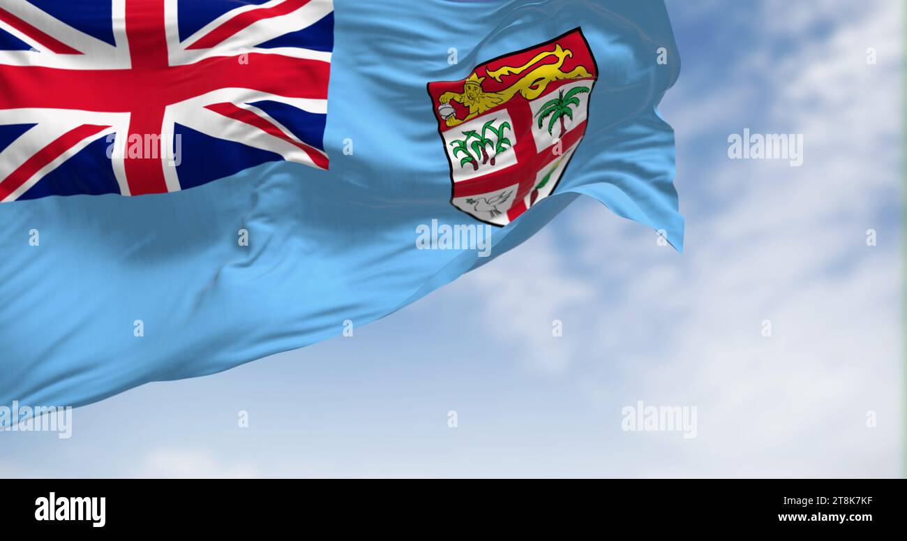 Detail of the national flag of FIji waving in the wind on a clear day ...