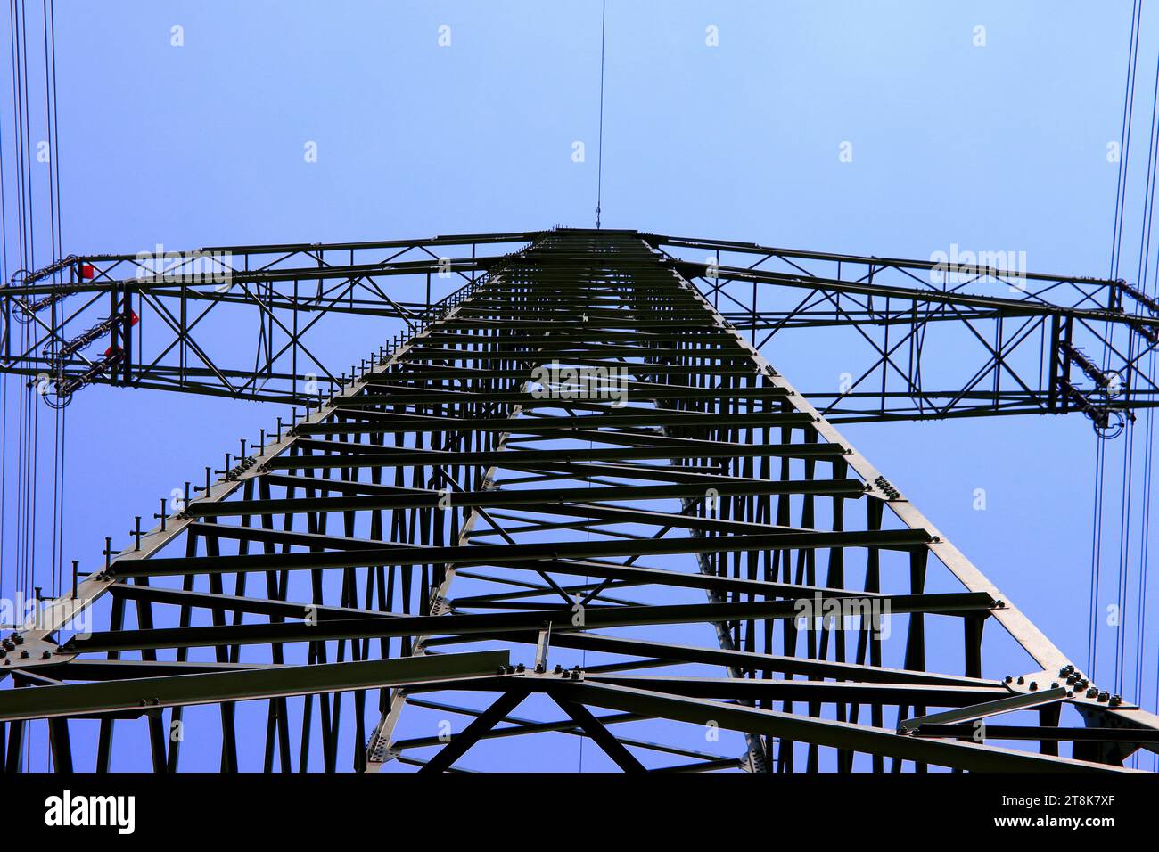 high-voltage pylon from below Stock Photo - Alamy