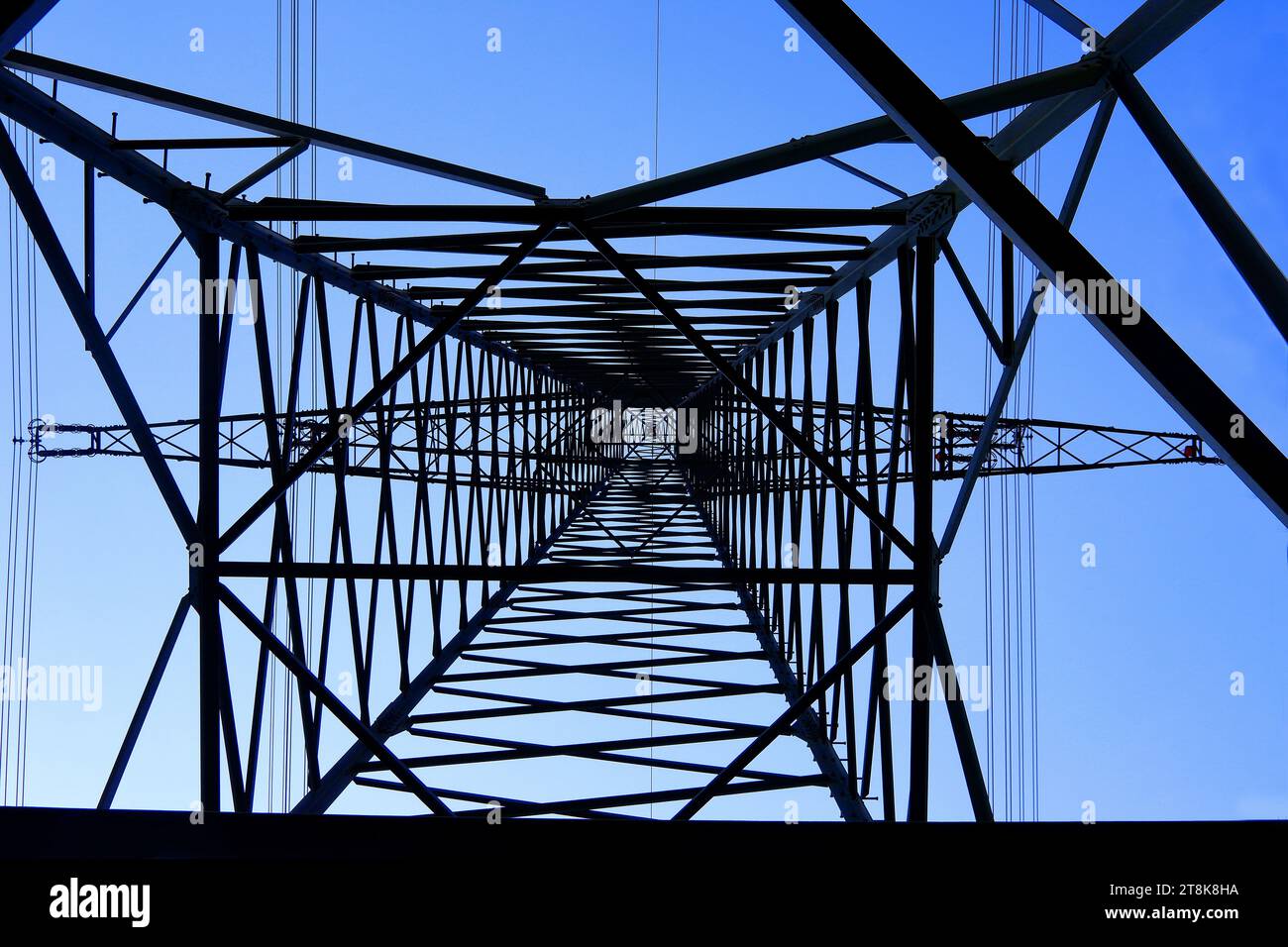 high-voltage pylon from below Stock Photo - Alamy