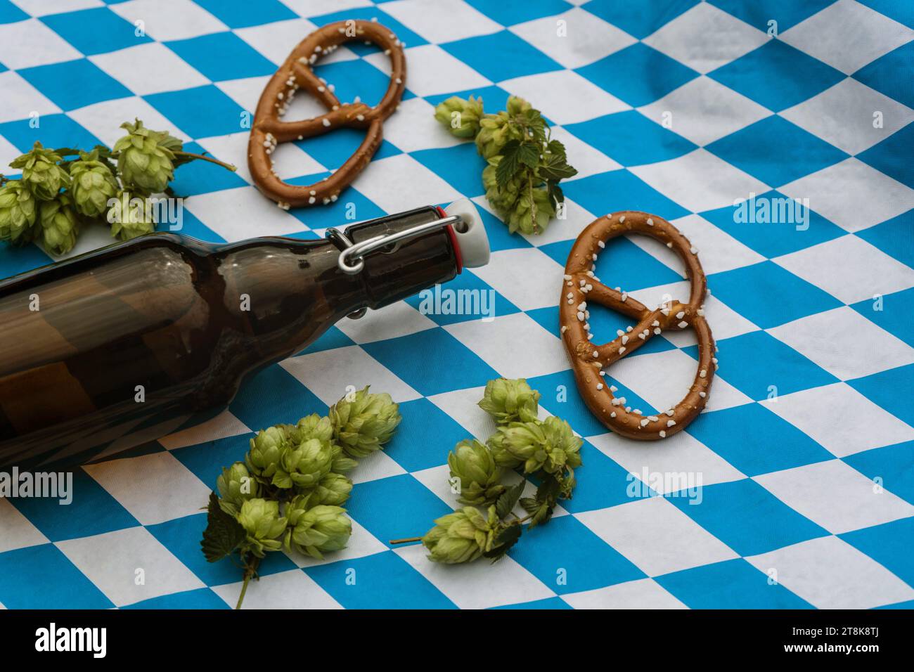 common hop (Humulus lupulus), bottle beer and hop cones and Brezn on ...