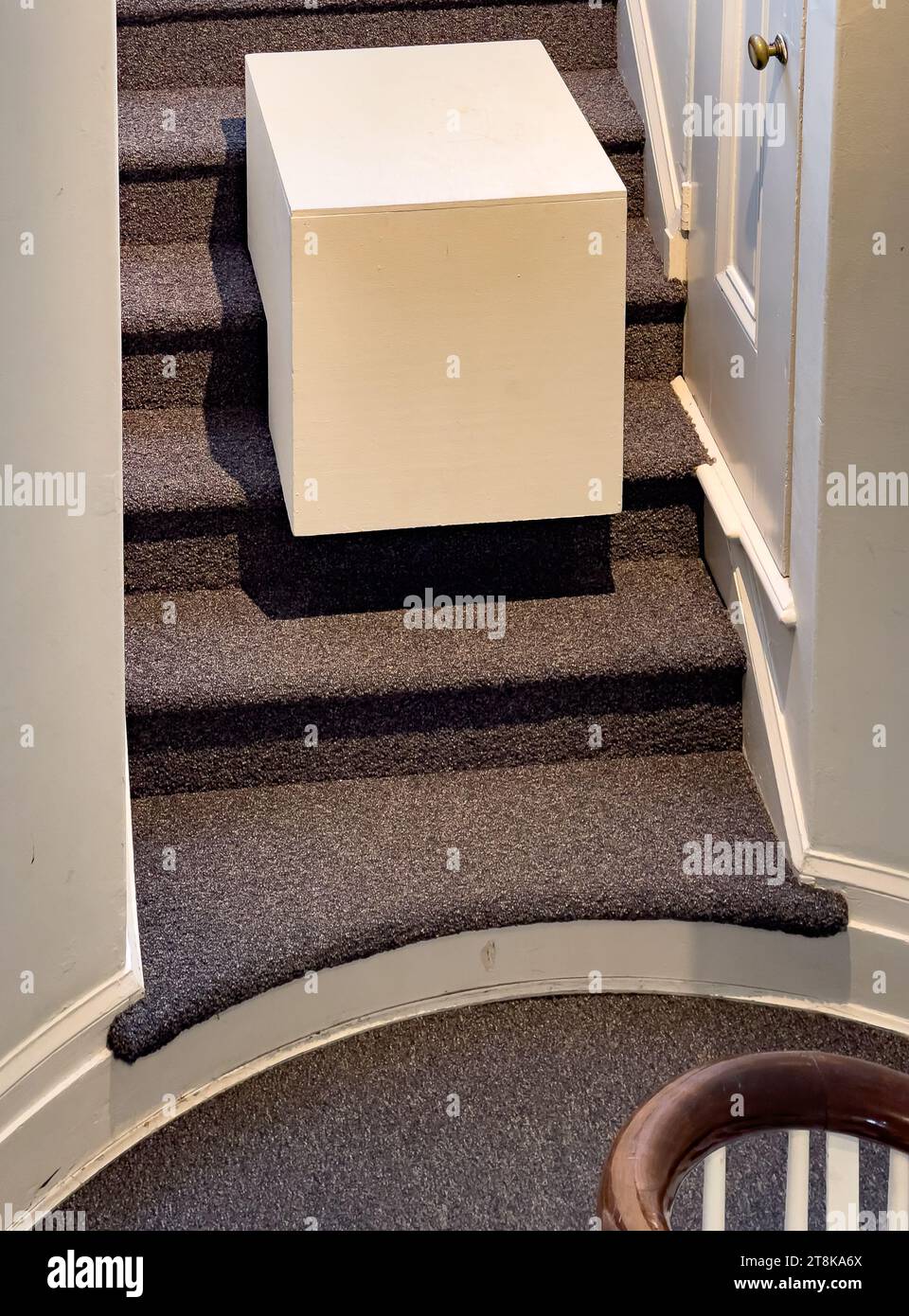 While cube structure on stairs Stock Photo - Alamy