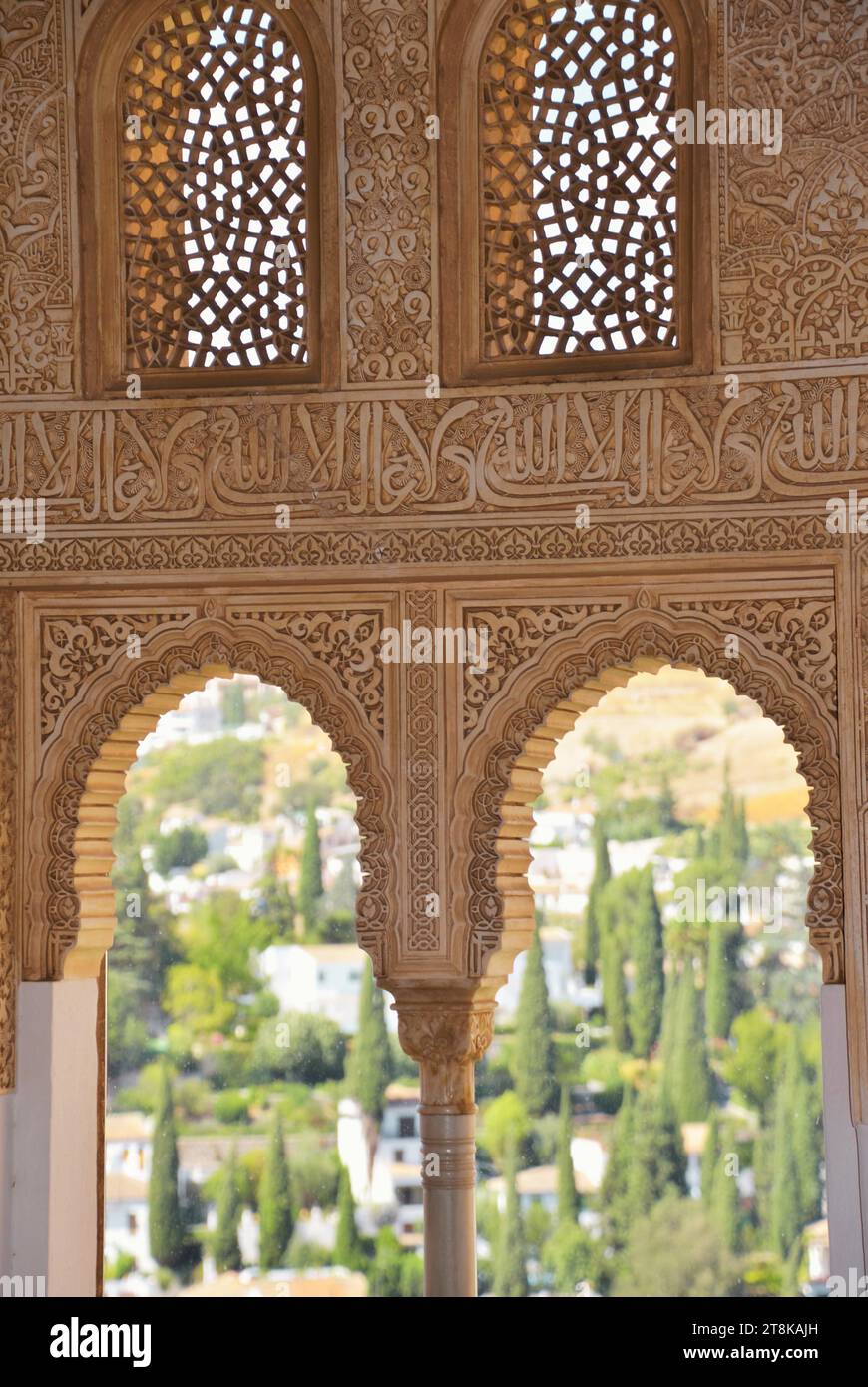 The walls of the Alhambra Palace are adorned with beautiful Arabic ...