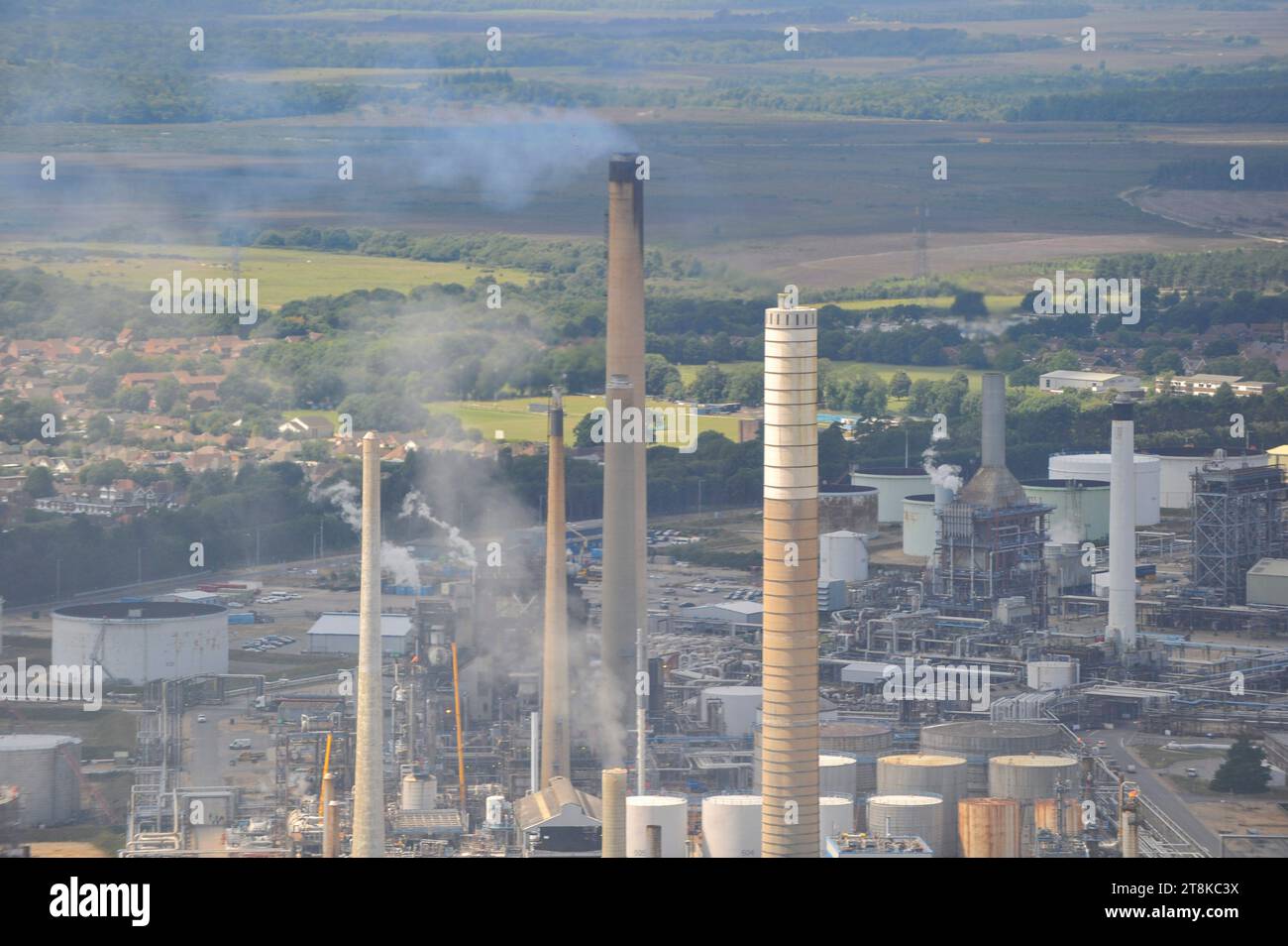 Aerial photograph of the flare stacks of Fawley refinery on the edge of ...