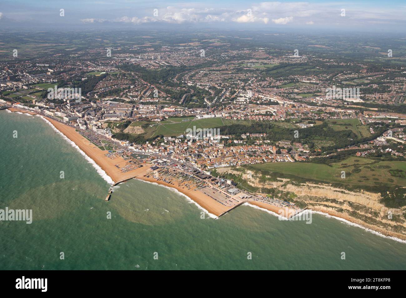 Aerial view of the coastal town of Eastbourne nestled along the shores ...