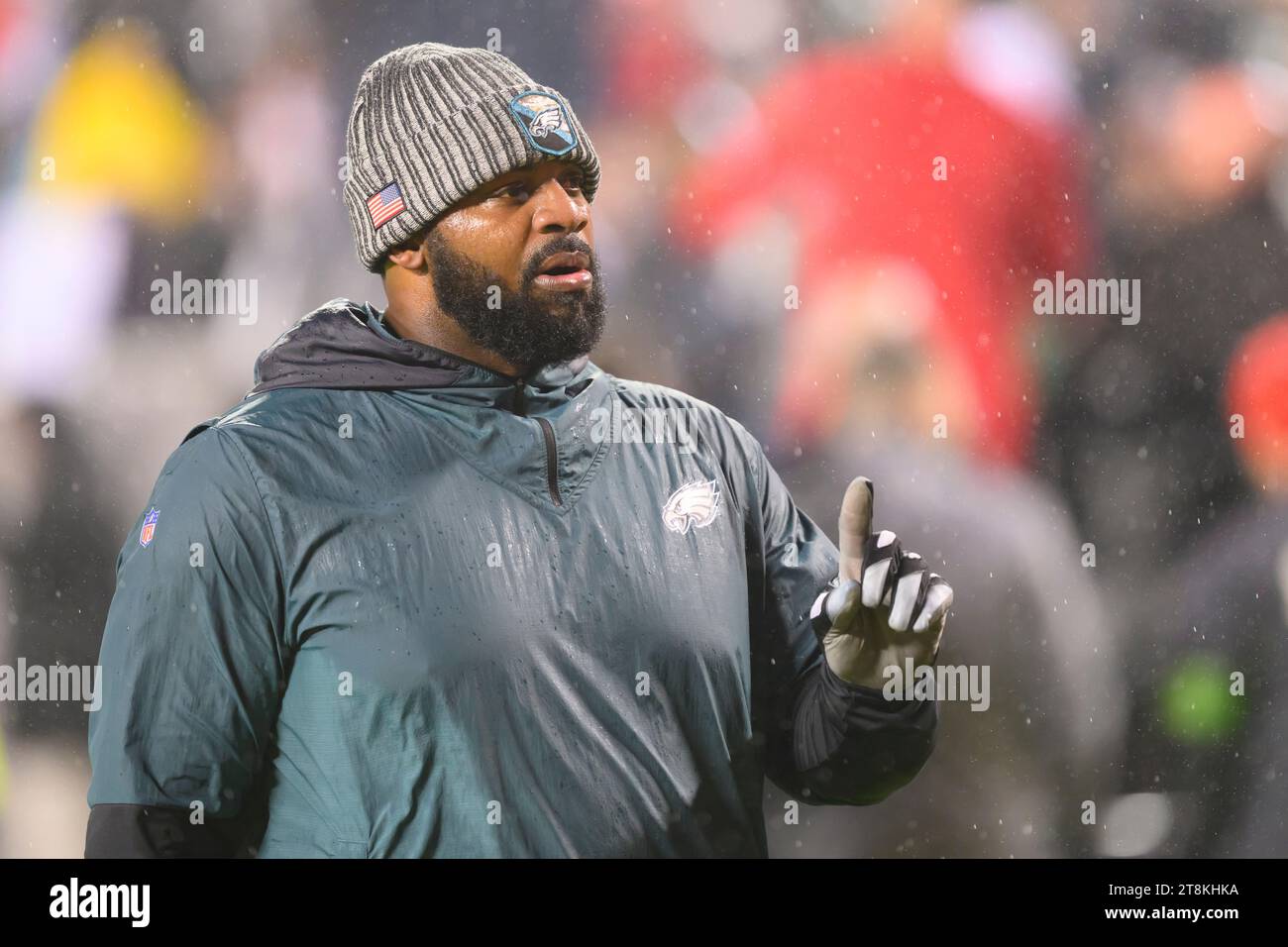 Philadelphia Eagles defensive tackle Fletcher Cox signals to a coach ...