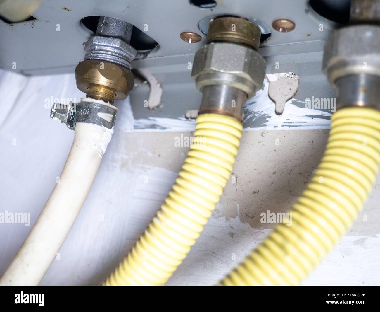 Part of gas equipment. Hoses in a gas water heater. Gas flows through ...