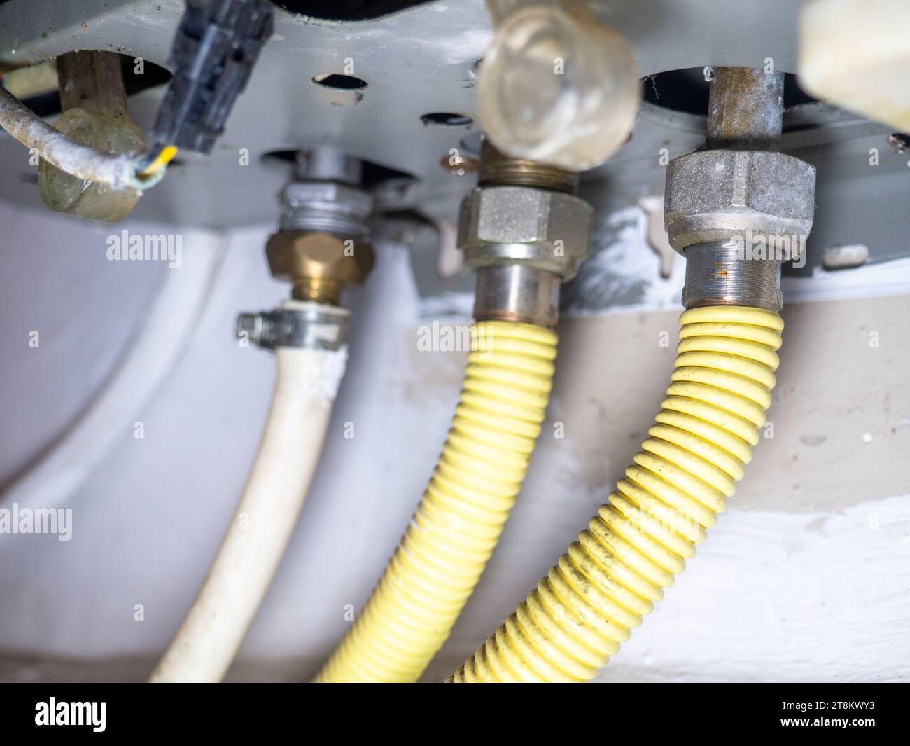 Part of gas equipment. Hoses in a gas water heater. Gas flows through ...