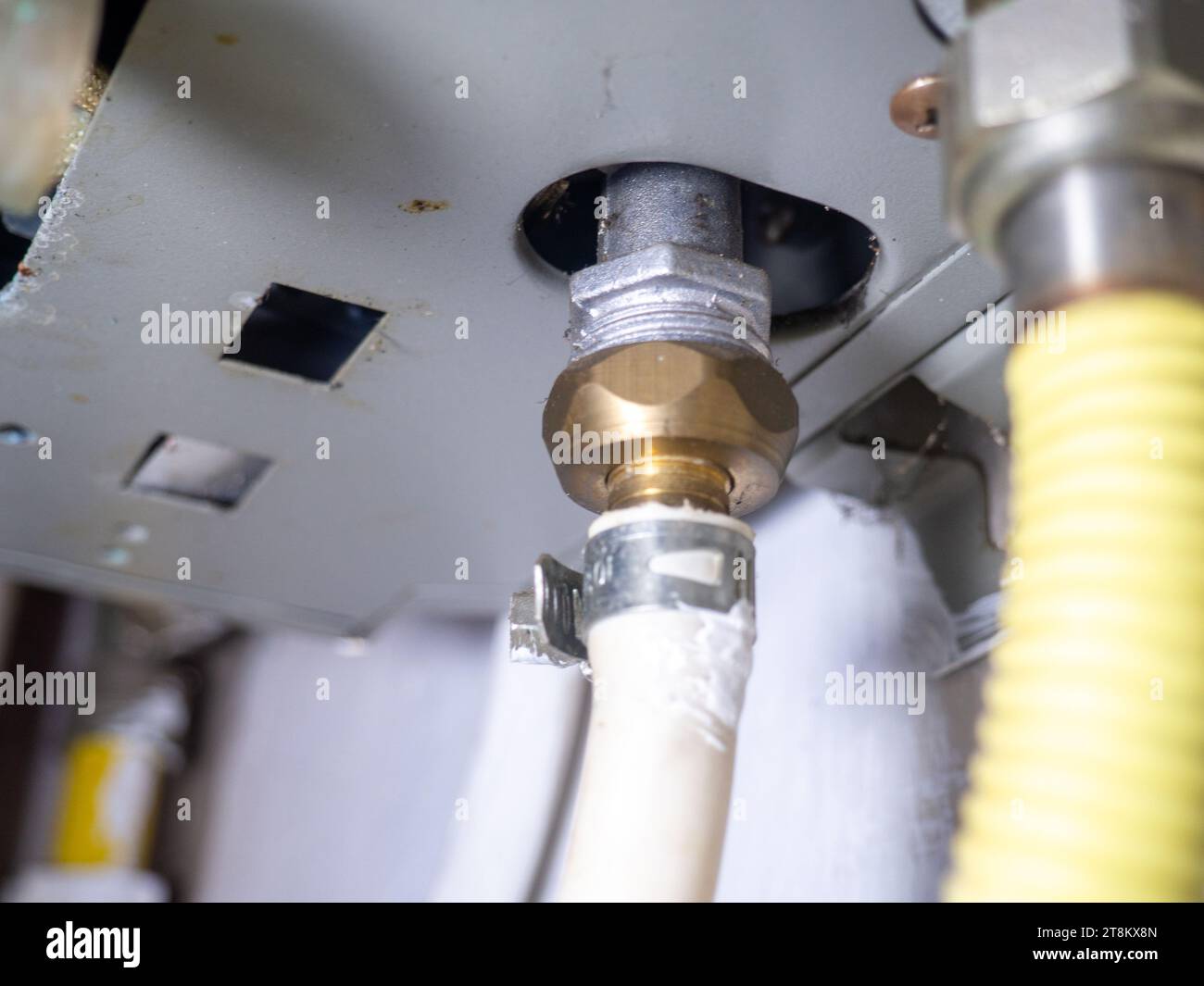 Part of gas equipment. Hoses in a gas water heater. Gas flows through ...