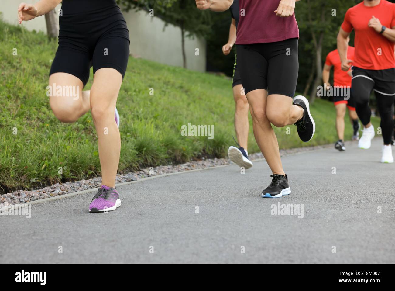 Group of people running outdoors, closeup view Stock Photo - Alamy