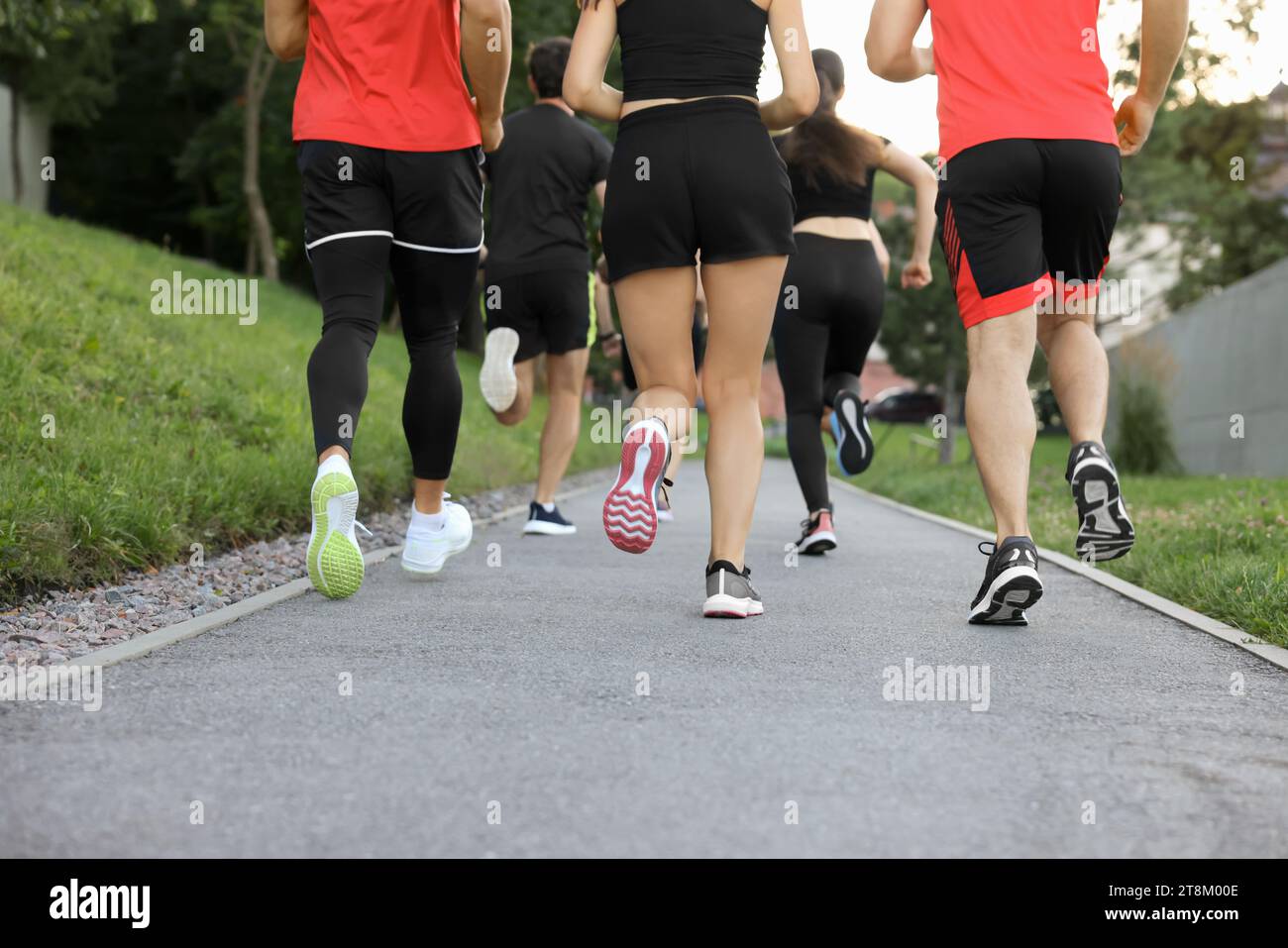 Group of people running outdoors, closeup view Stock Photo - Alamy
