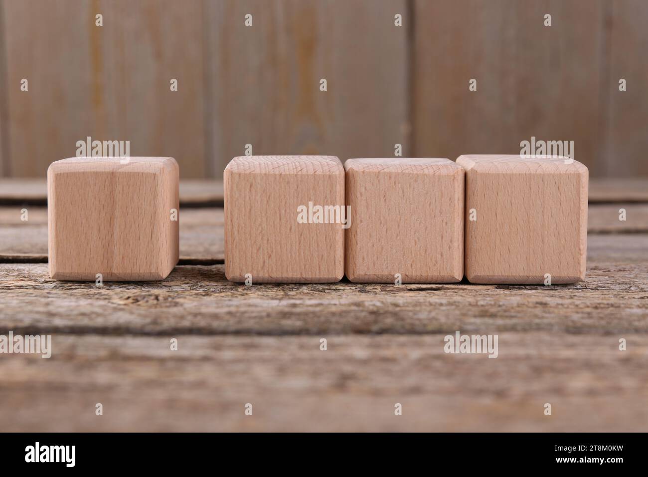 Cubes with check mark and abbreviation ISO on wooden table Stock Photo ...