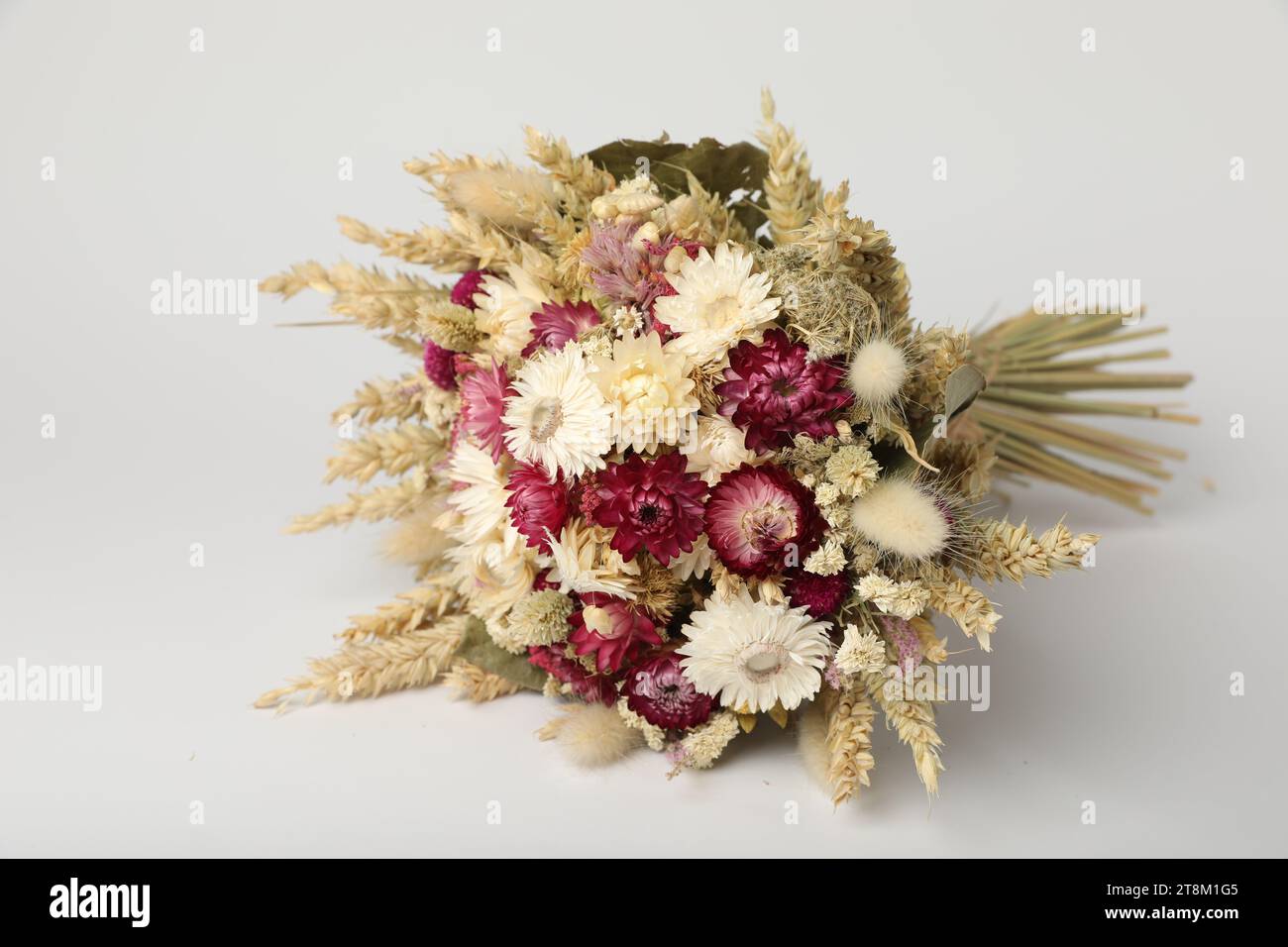 Beautiful bouquet of dry flowers on white background Stock Photo - Alamy