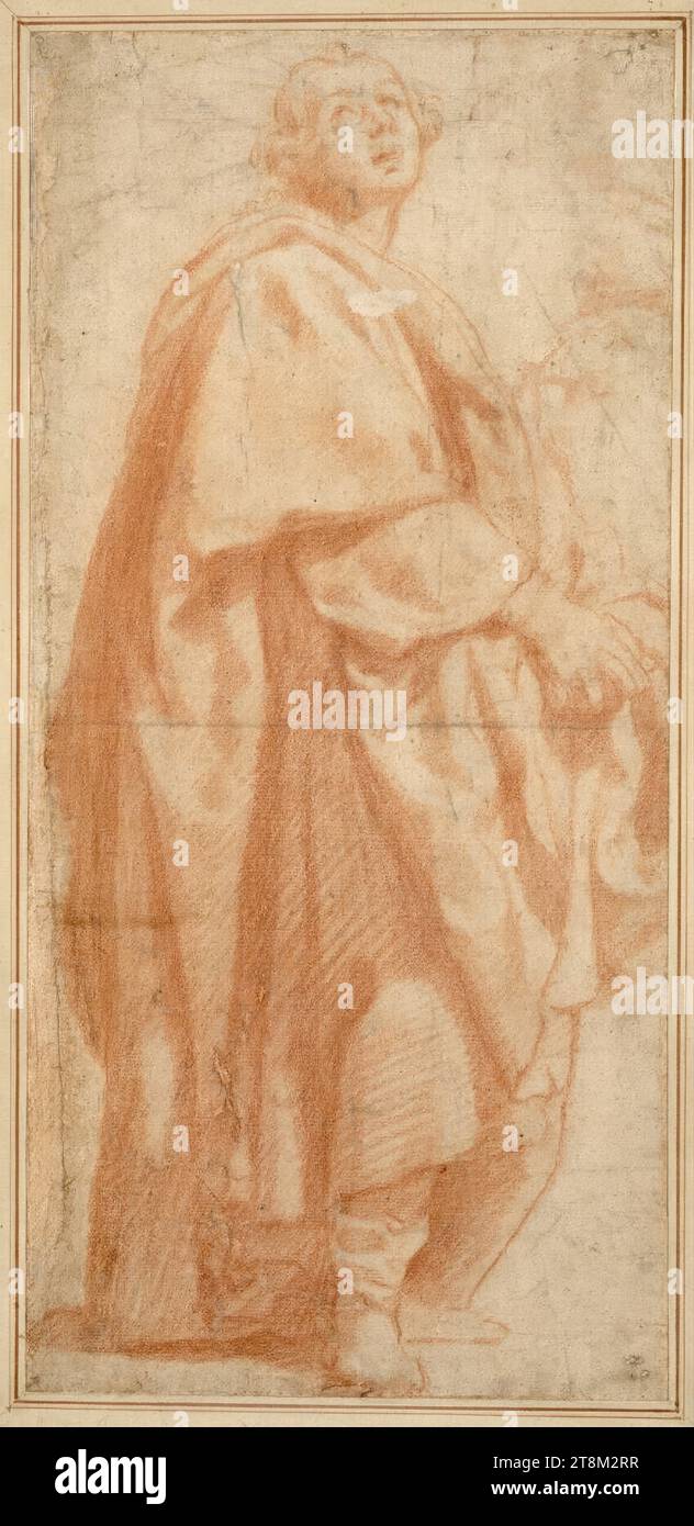 John the Evangelist standing to the right with folded hands, wrapped in ...