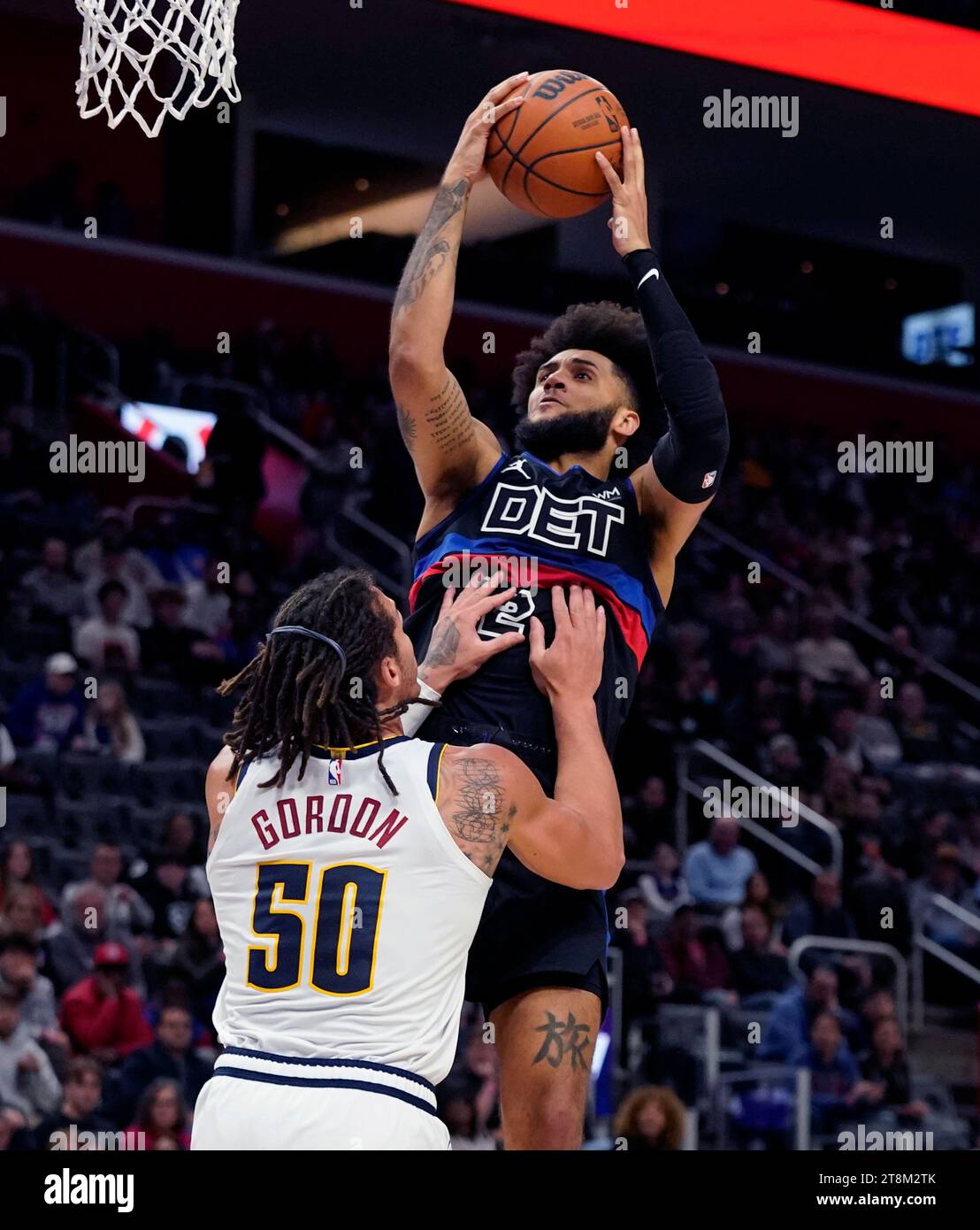 Detroit Pistons forward Isaiah Livers (12) shoots over Denver Nuggets ...