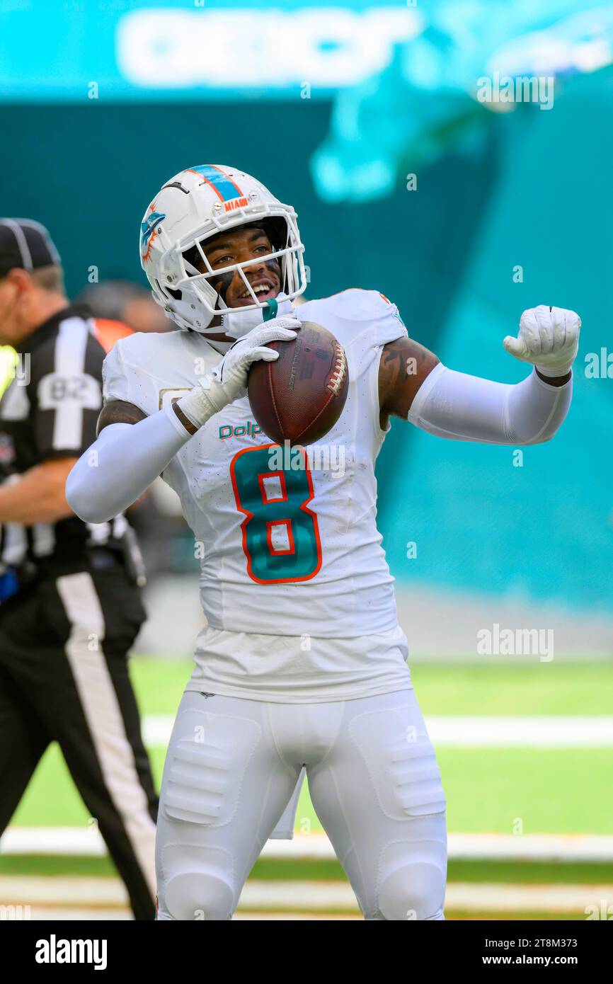 Miami Dolphins safety Jevon Holland (8) smiles as he holds a football ...
