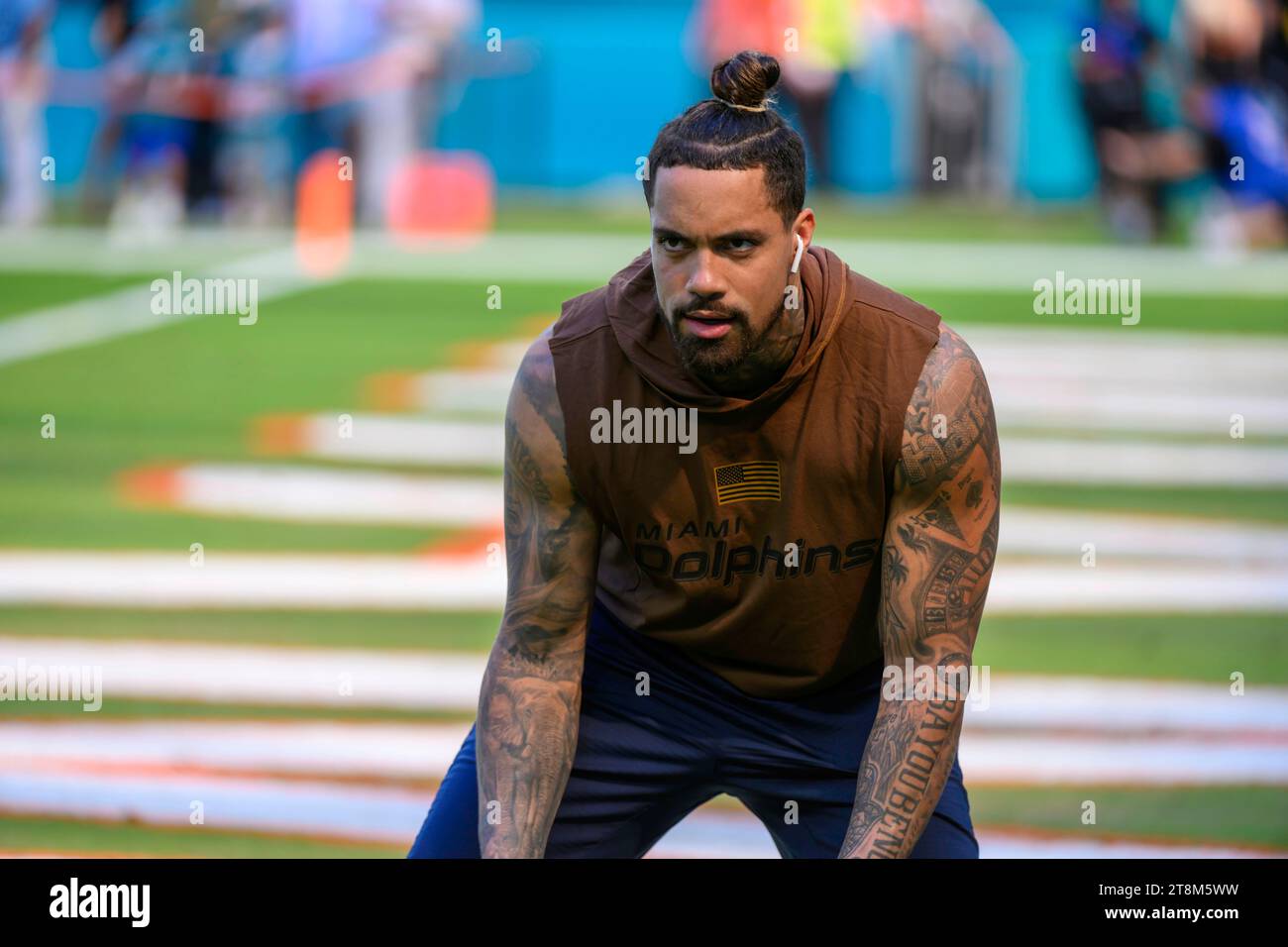 Miami Dolphins linebacker Duke Riley (45) warms up on the field before ...