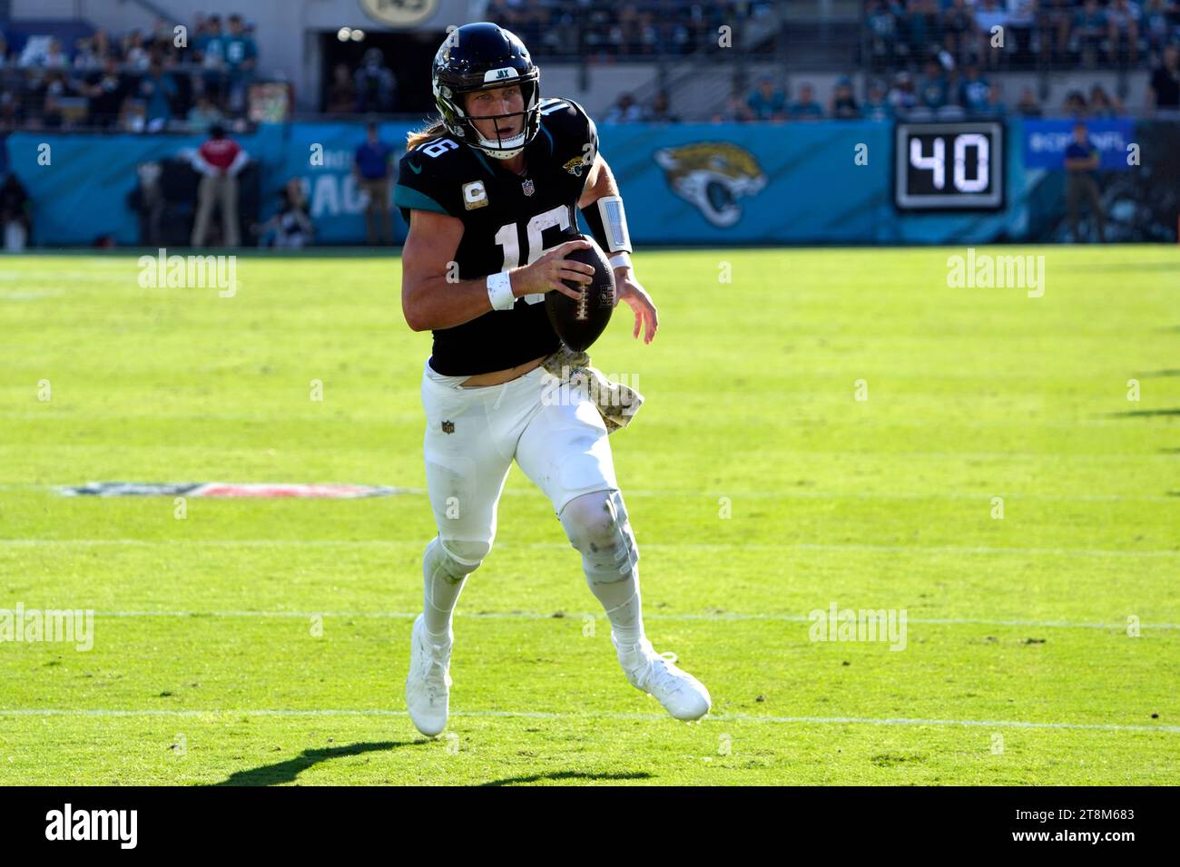 Jacksonville Jaguars quarterback Trevor Lawrence (16) scrambles for ...