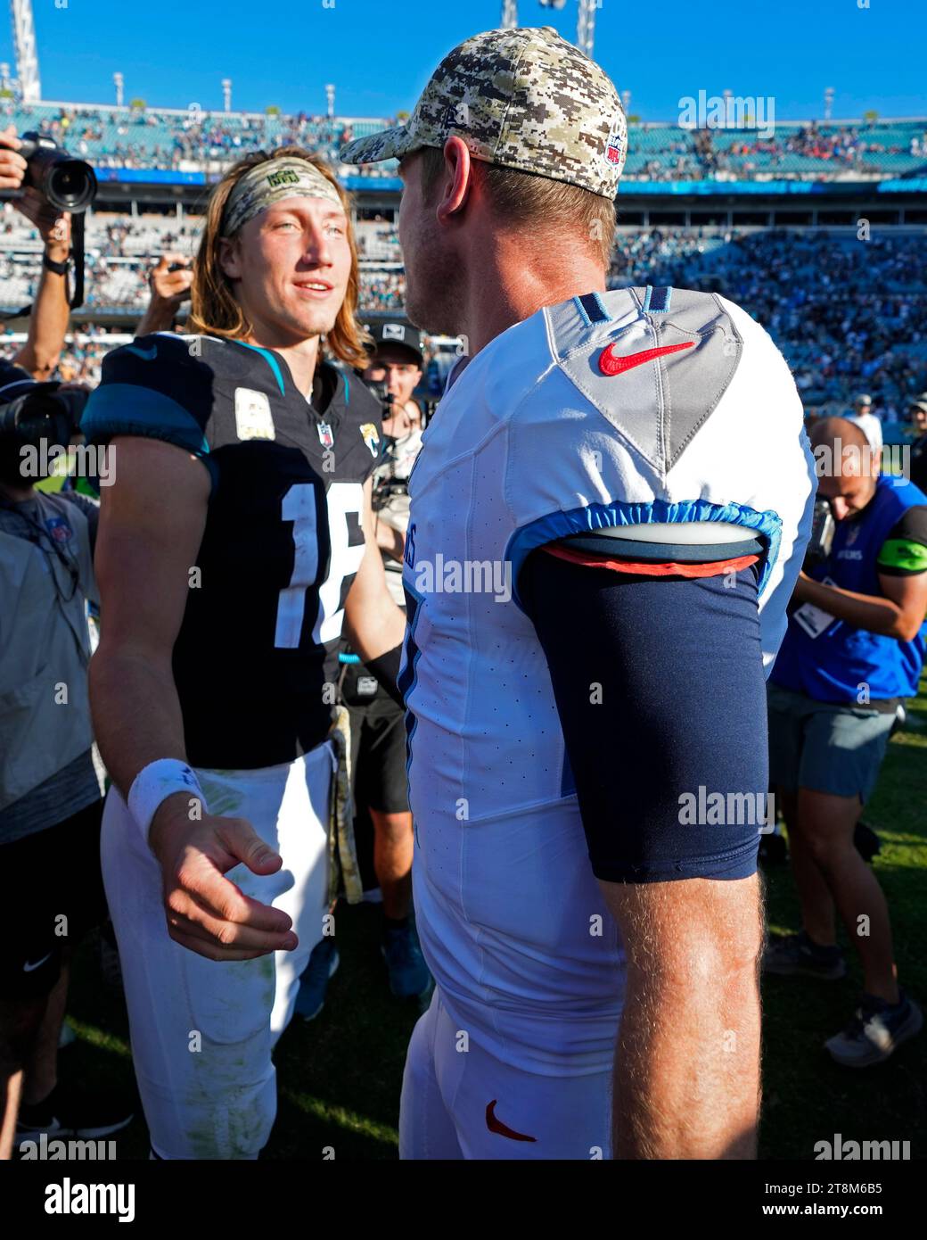 Jacksonville Jaguars quarterback Trevor Lawrence (16) greets Tennessee ...