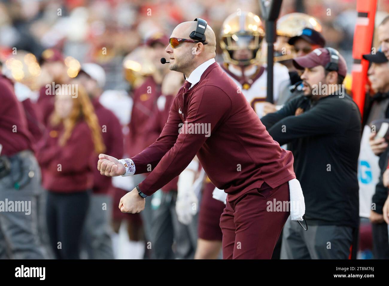 Minnesota head coach P.J. Fleck walks the sidelines during their NCAA ...