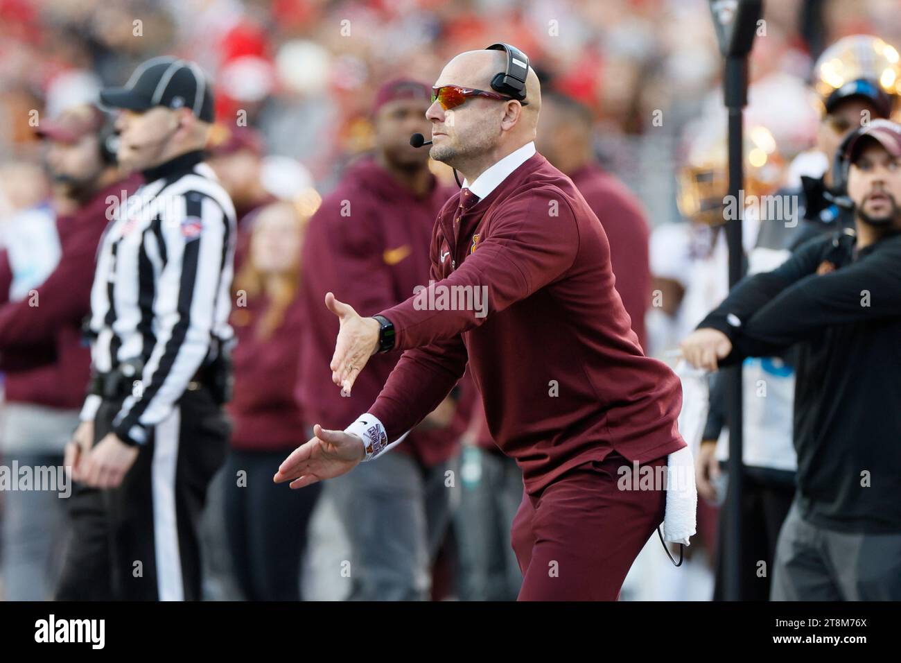 Minnesota head coach P.J. Fleck walks the sidelines during their NCAA ...